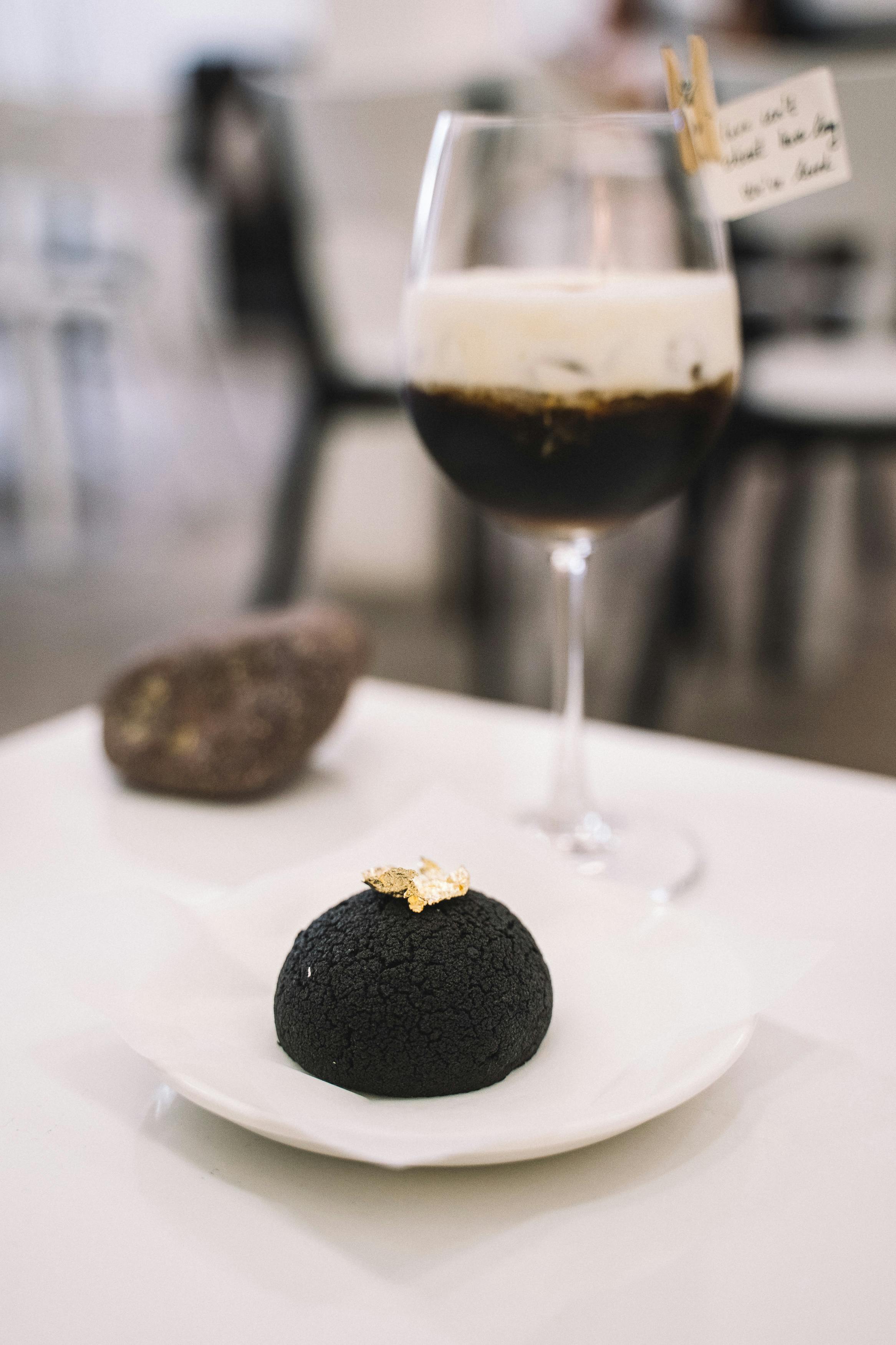 Close-up Photo of Small Black Cake · Free Stock Photo