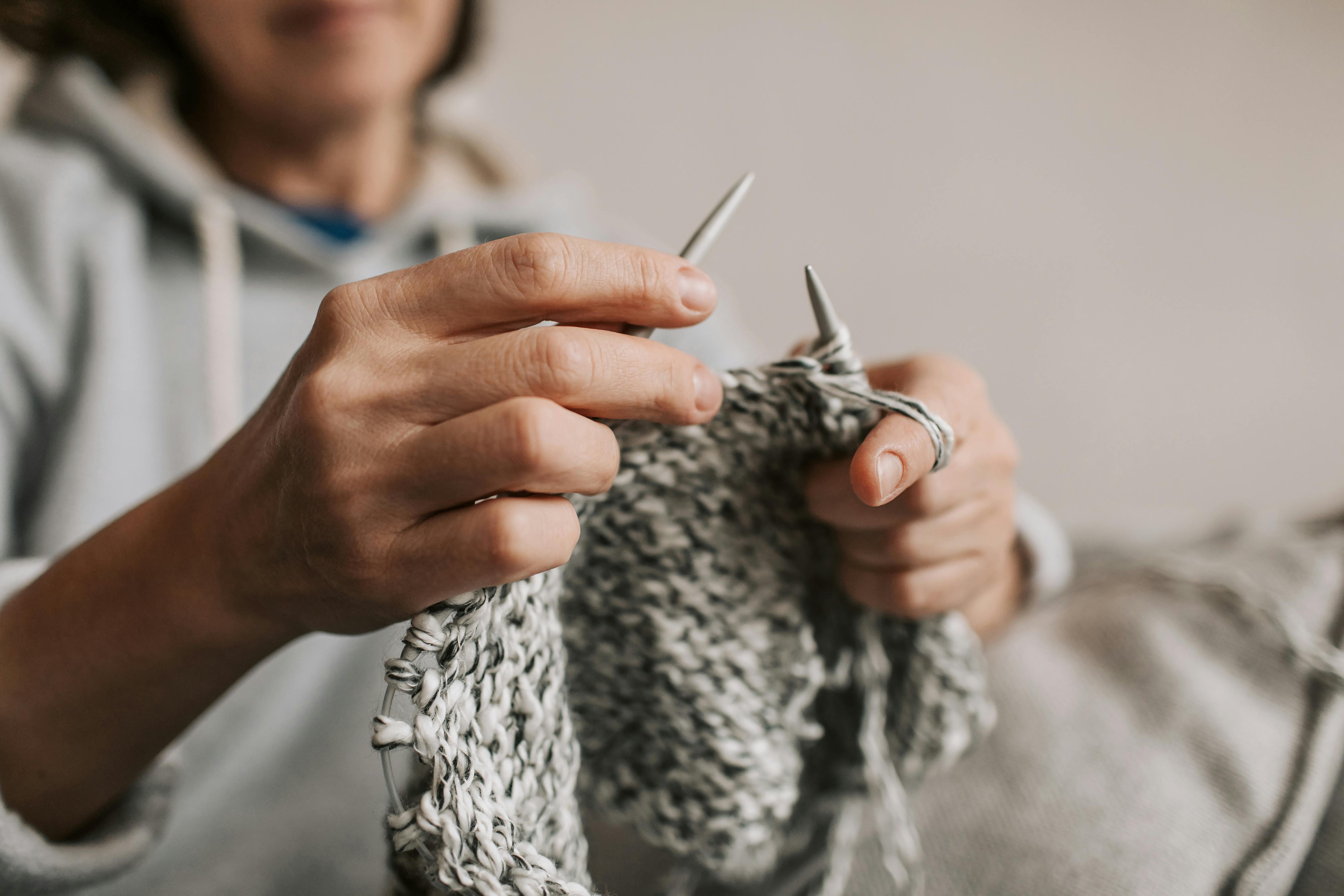 A Person Knitting Textile · Free Stock Photo