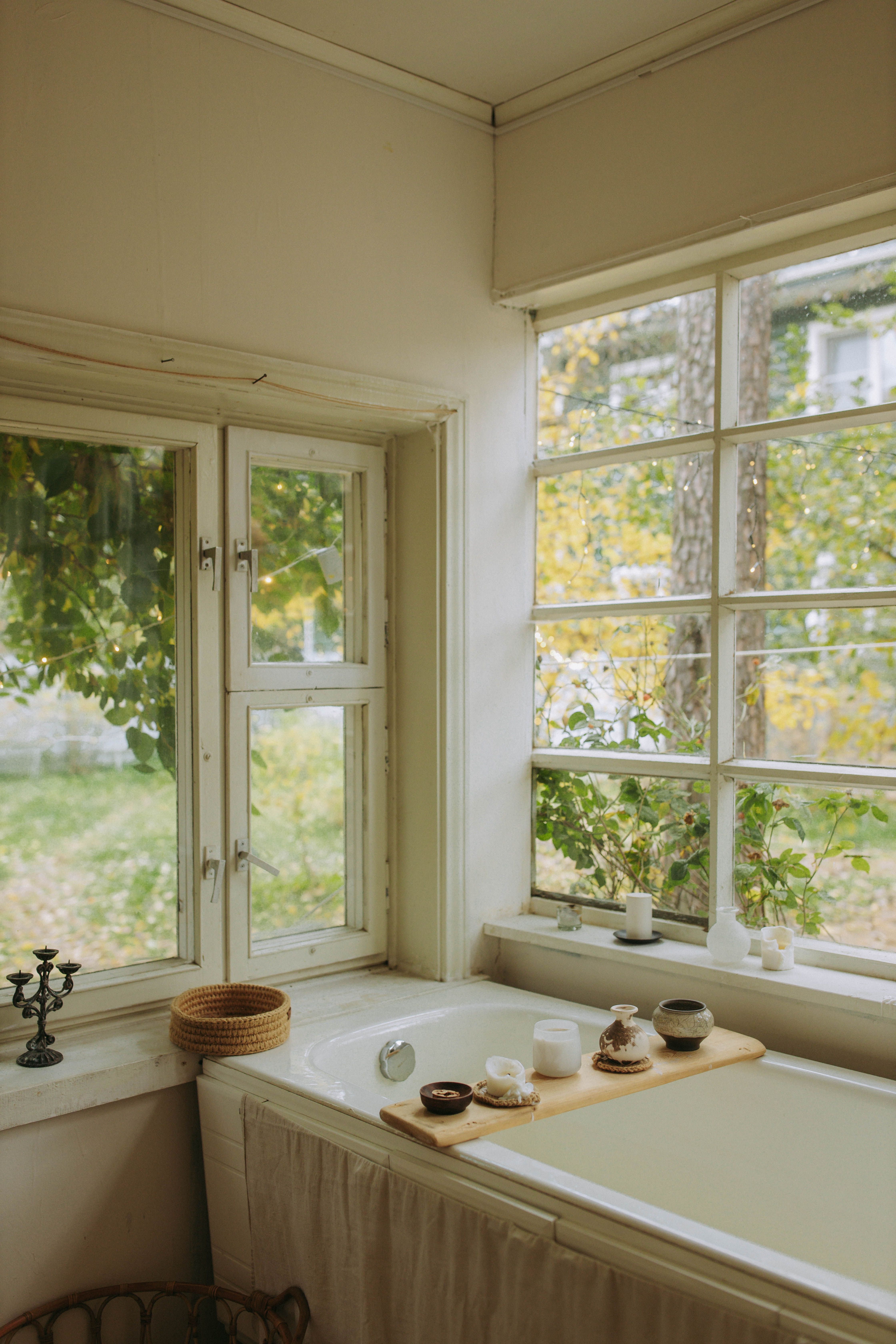 A Bathtub Beside the Window · Free Stock Photo