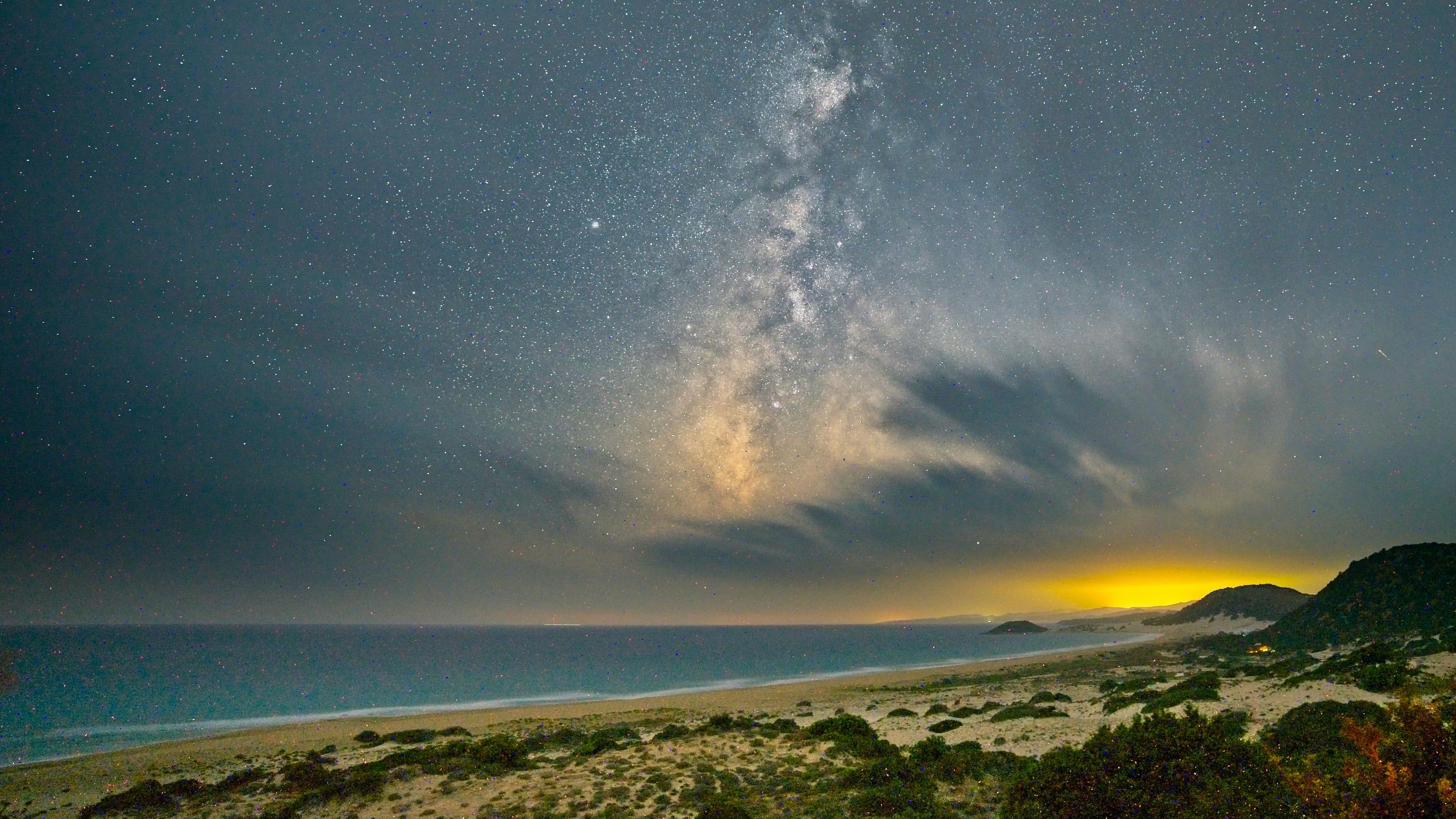 Starry sky over sea in night time · Free Stock Photo