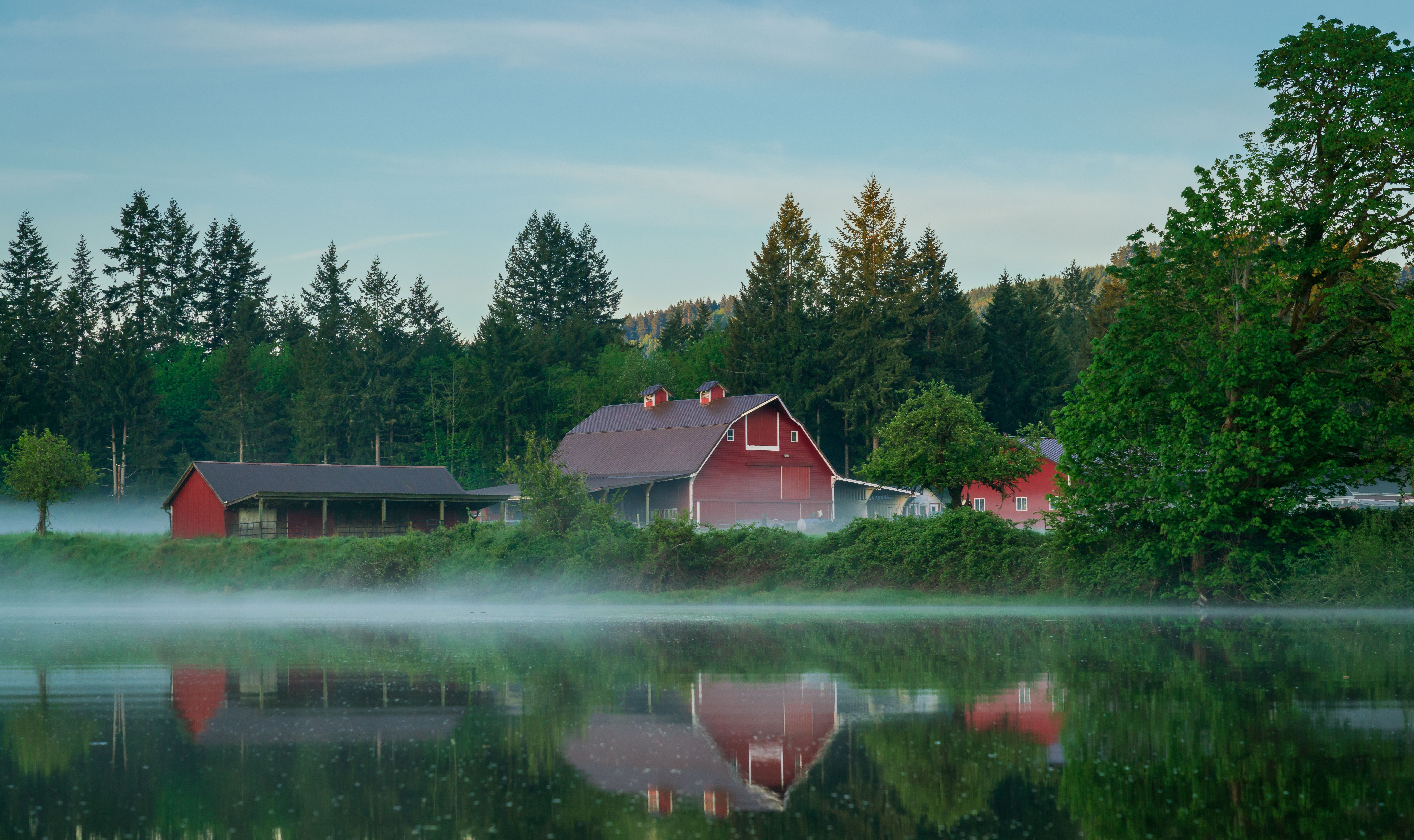 Fog Floating Over Water and Among Mountain Cabins in a Valley · Free ...
