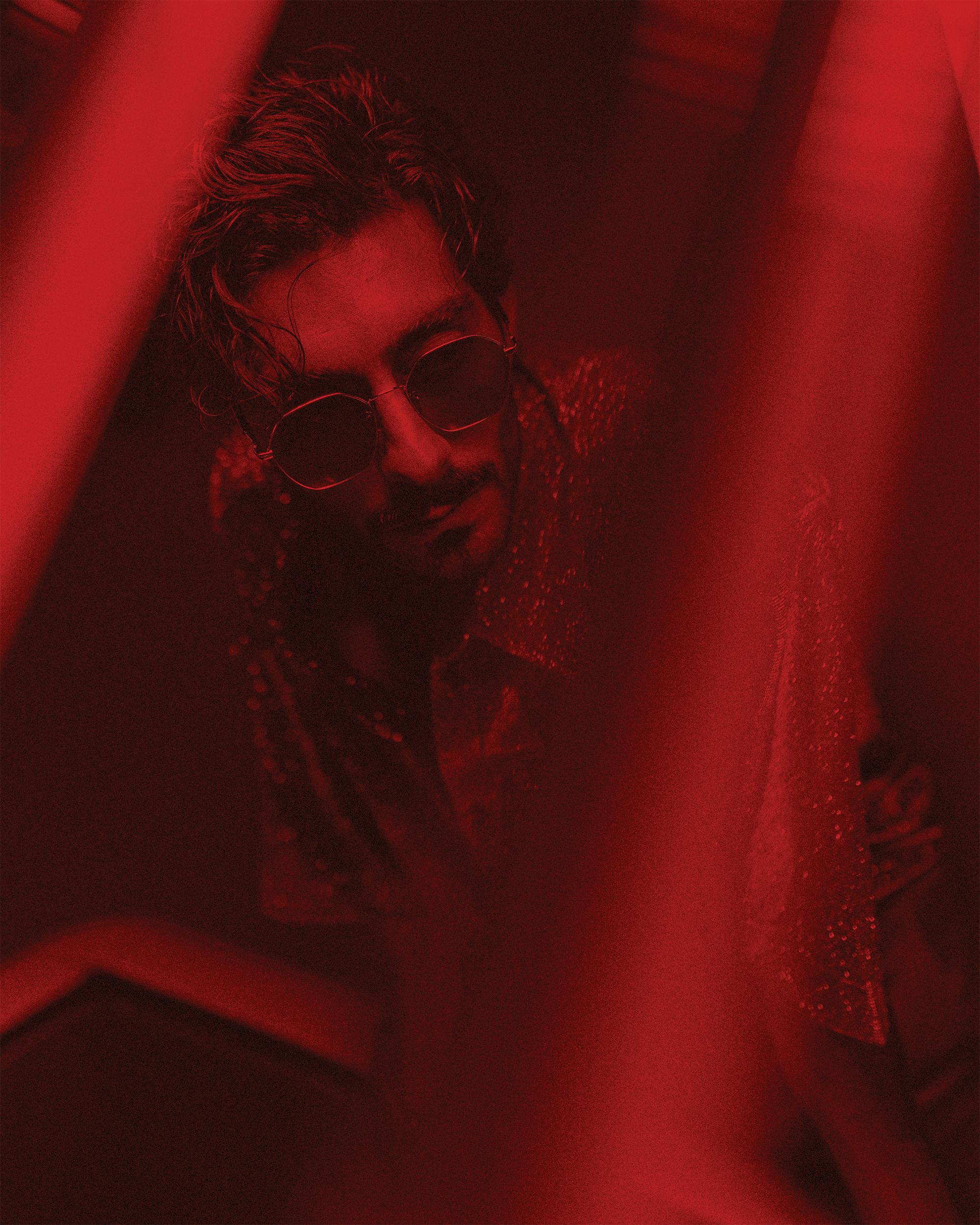Young bearded man in red light · Free Stock Photo