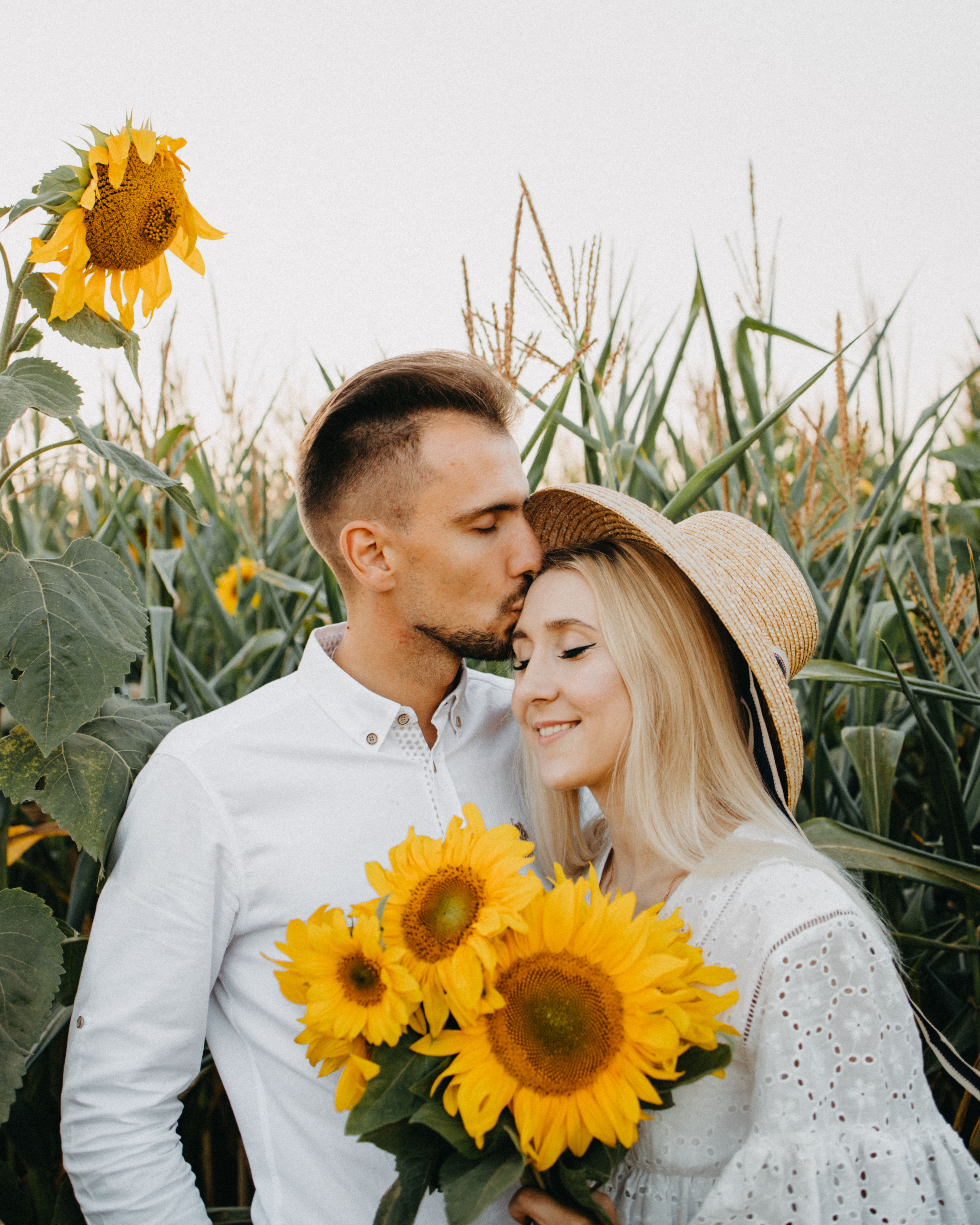 A Man Kissing the Woman in Forehead · Free Stock Photo