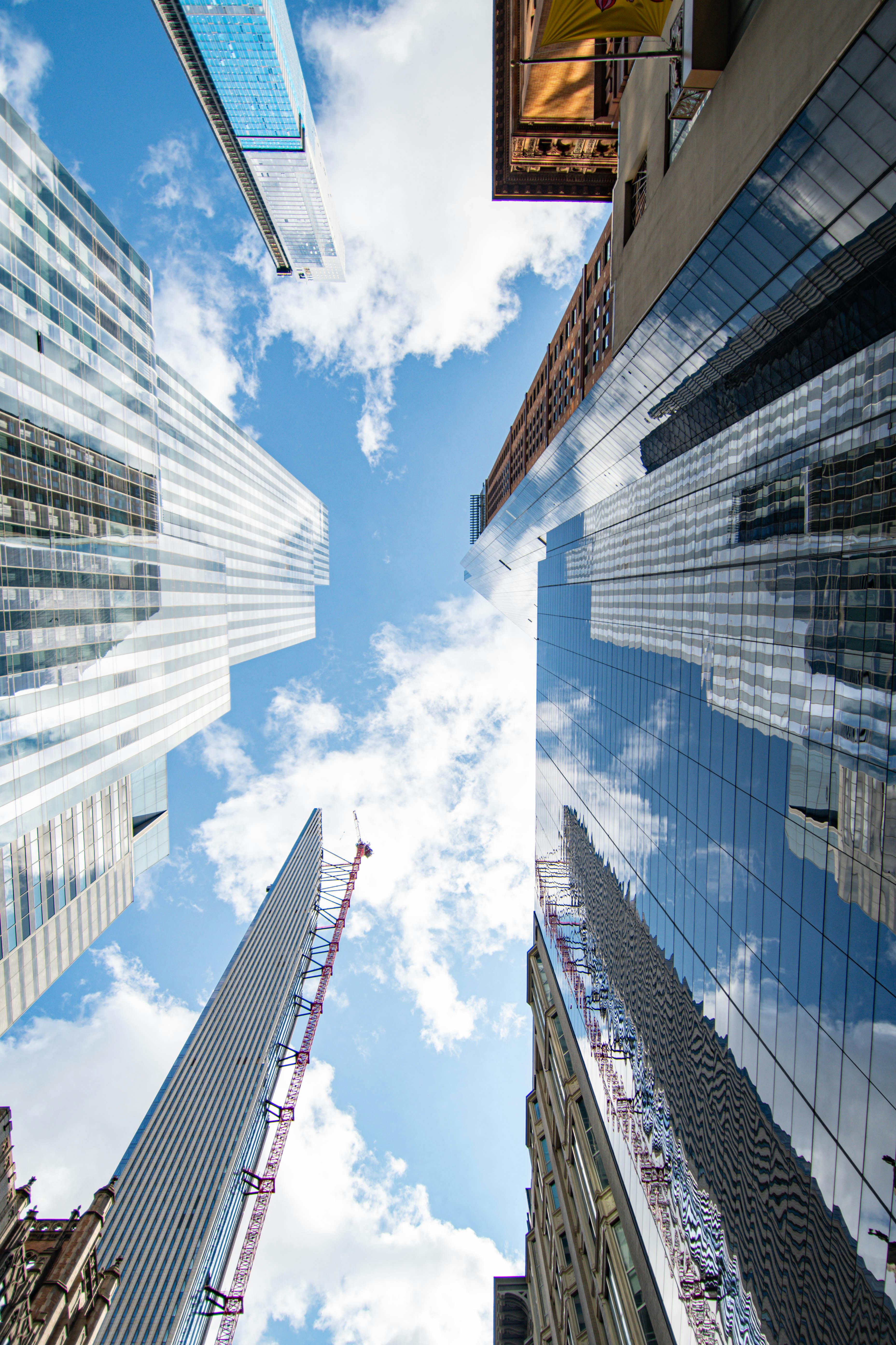 High Rise Buildings Under Cloudy Sky · Free Stock Photo