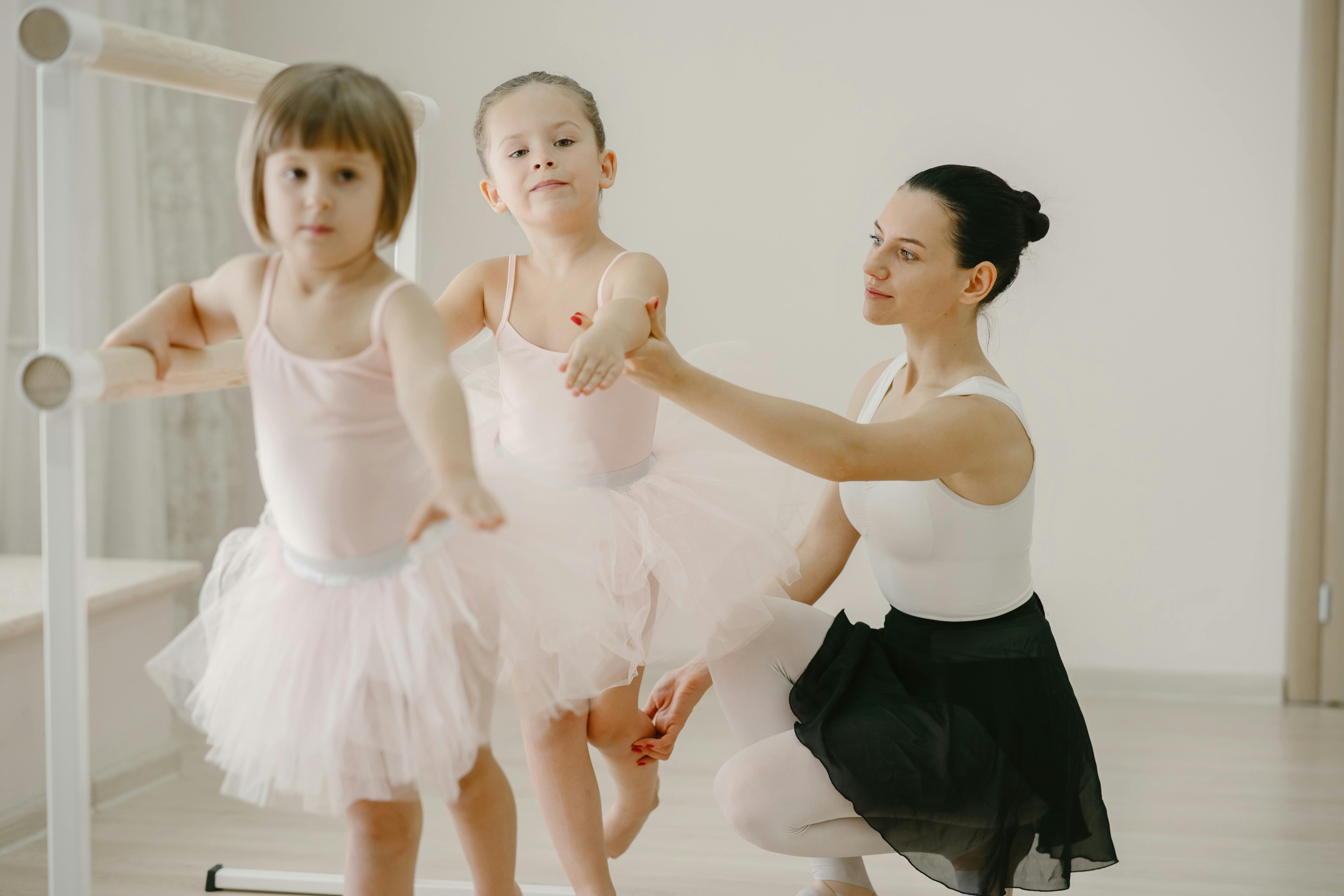 A Woman Teaching Girls in a Ballet Class · Free Stock Photo