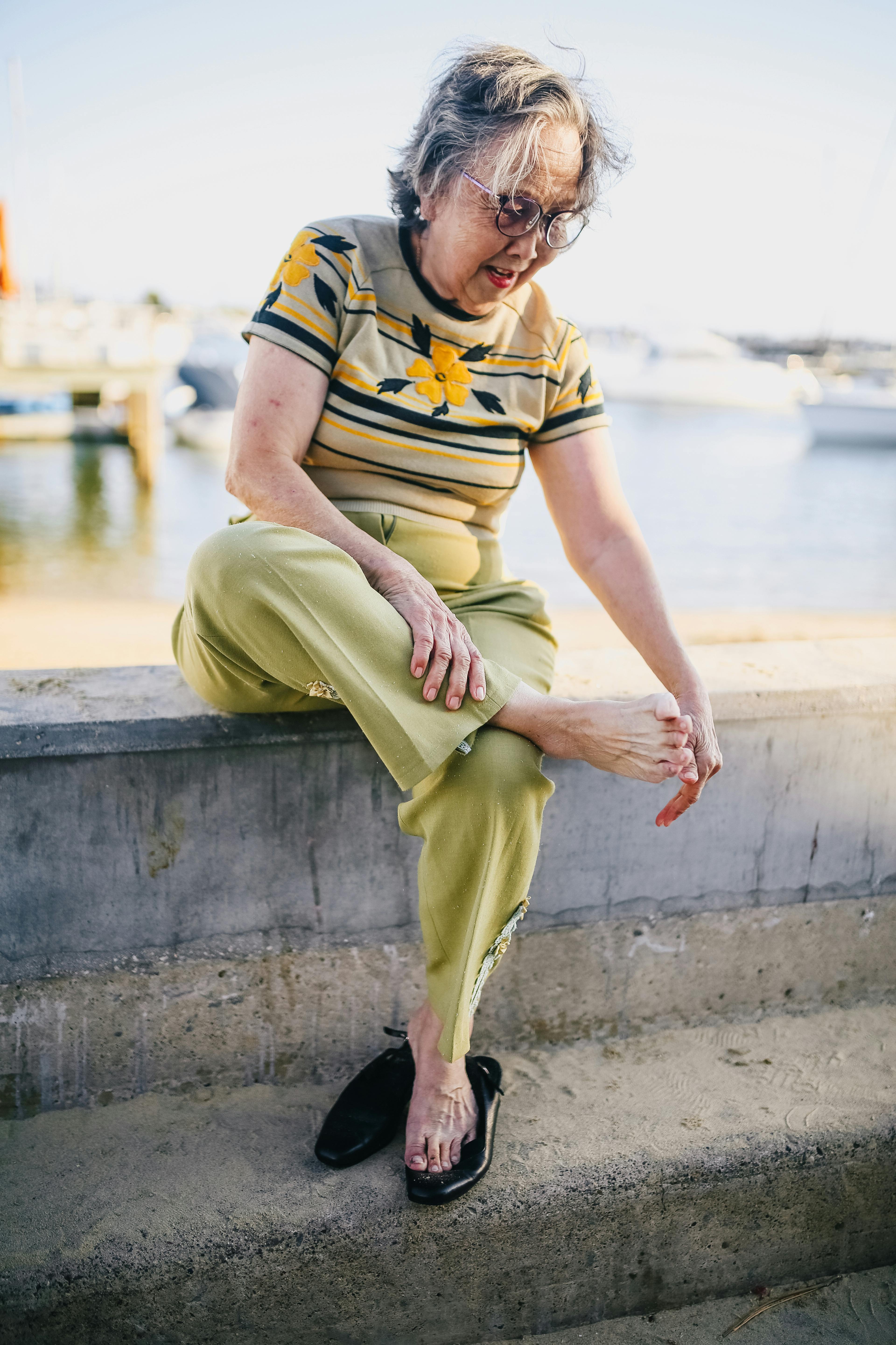 Elderly Woman Tired of Walking · Free Stock Photo