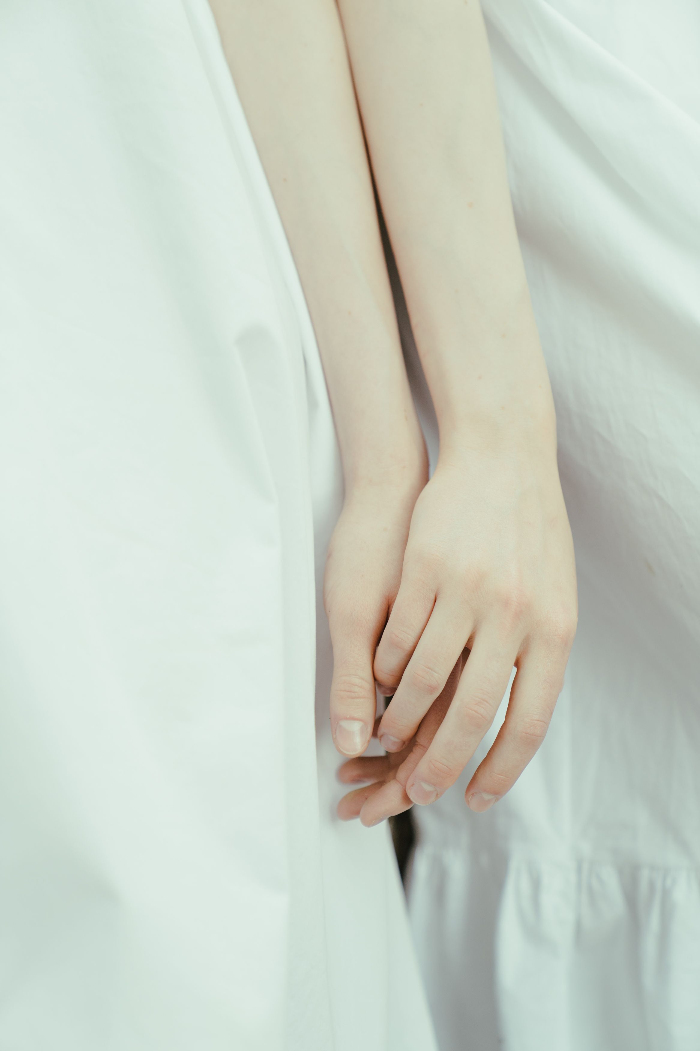 Close up on Hands Hugging Person Arm · Free Stock Photo
