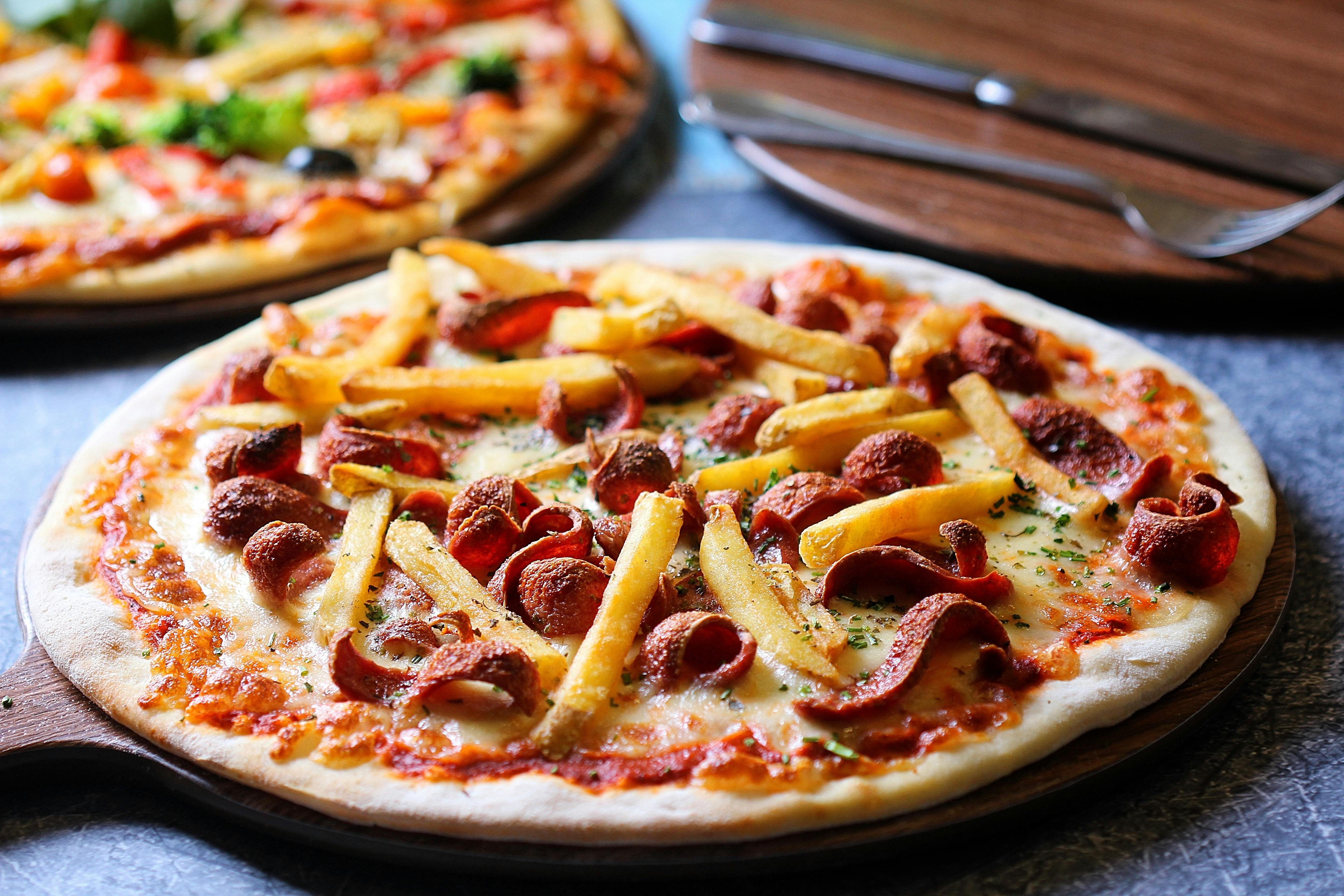 Copy Space Photo of Pizza on Table · Free Stock Photo