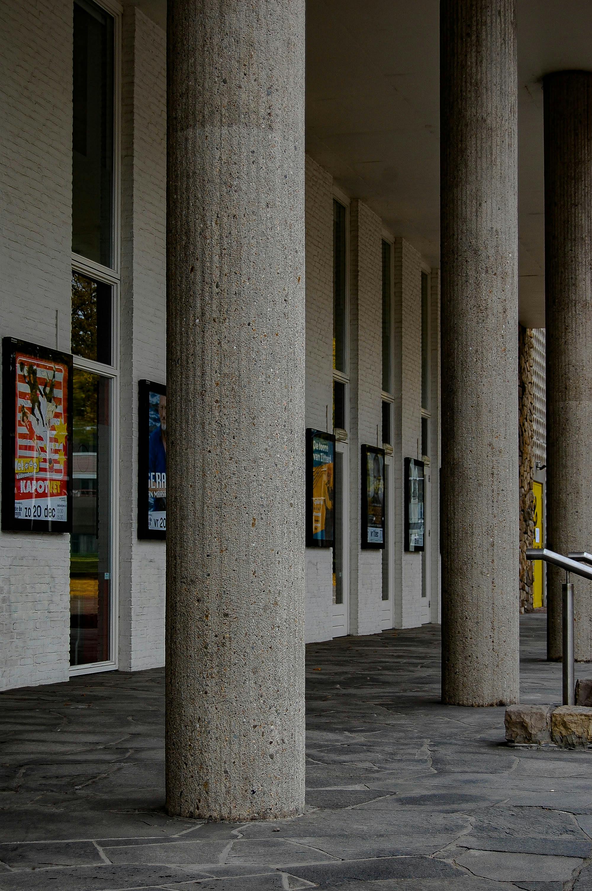 Facade of a Building with Large Concrete Pillars · Free Stock Photo