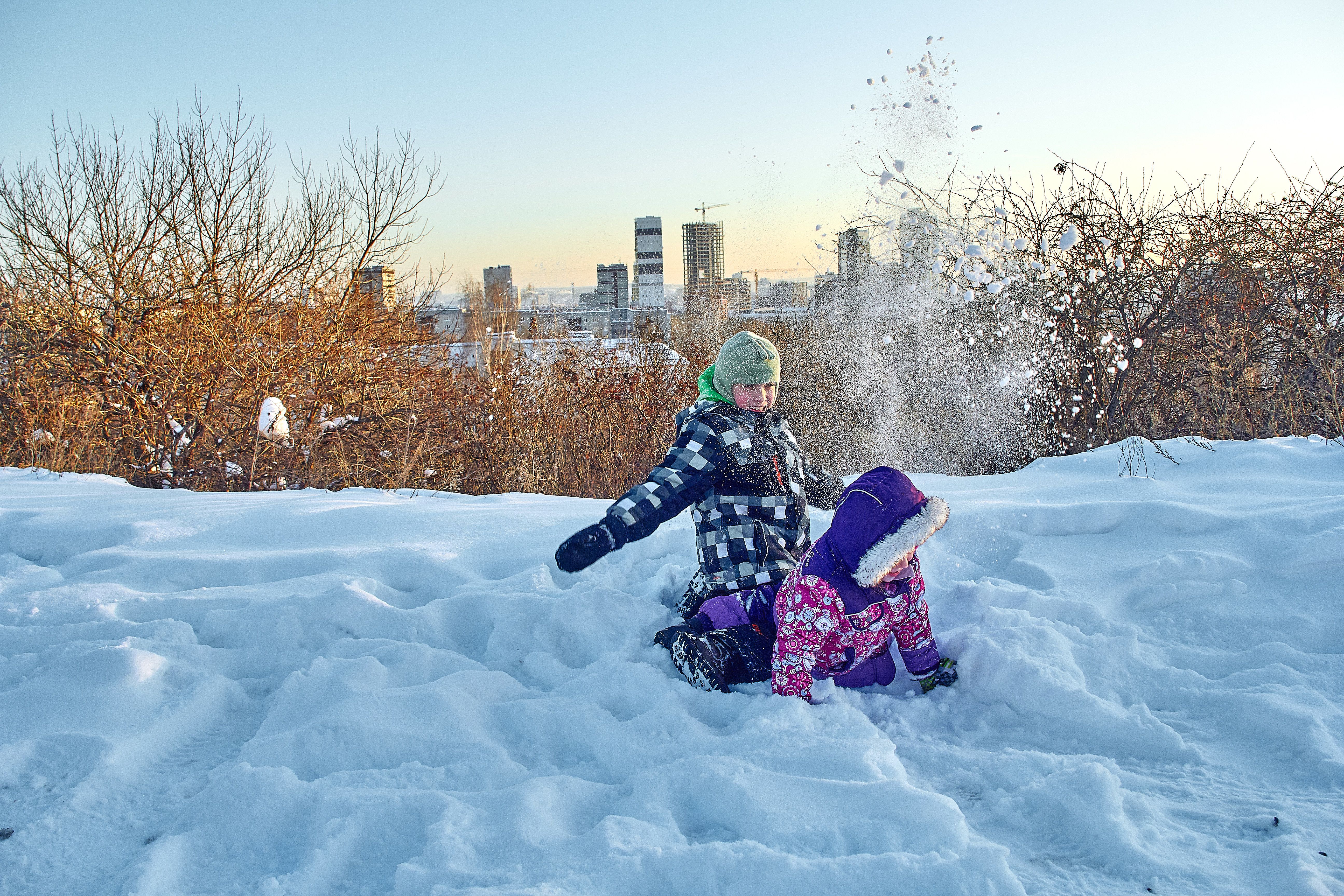 Two Kids Playing on the Snow · Free Stock Photo