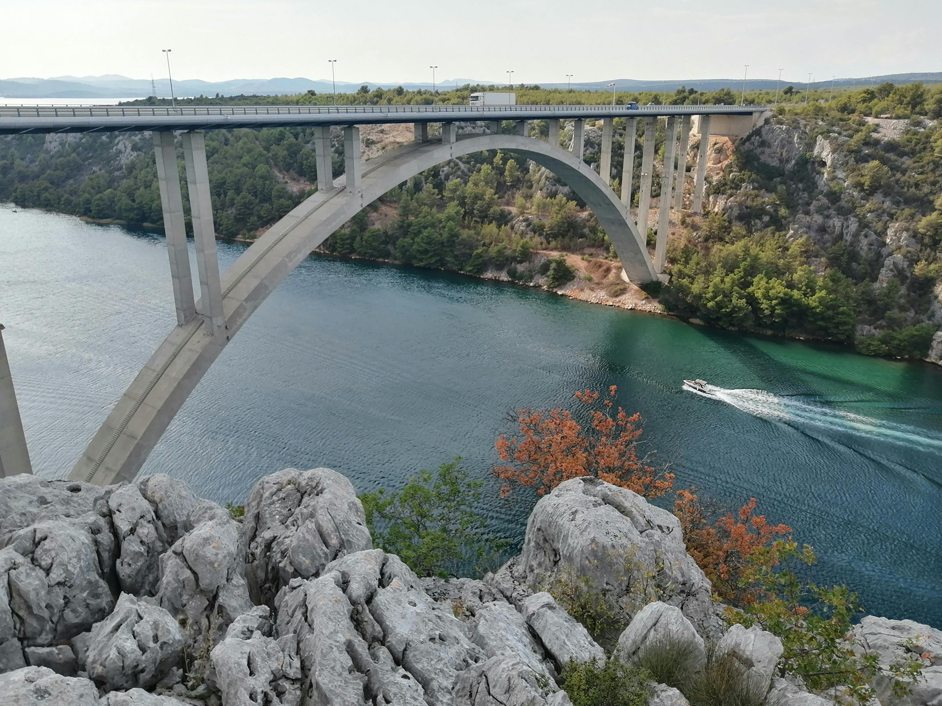Arch over Water Canal in Town · Free Stock Photo