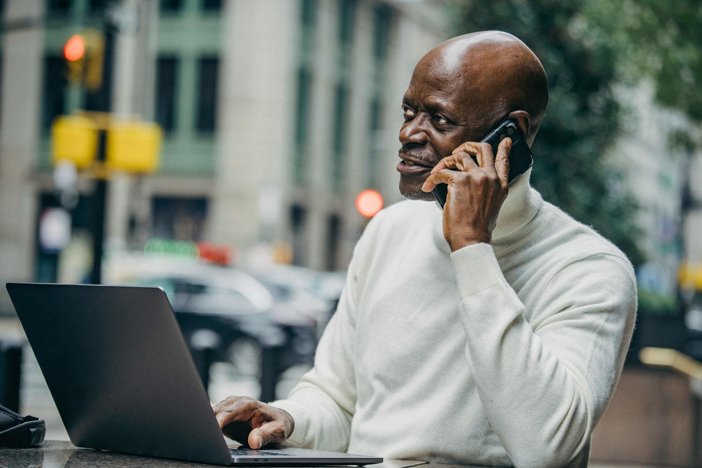 Black businessman talking on mobile phone · Free Stock Photo Black businessman talking on mobile phone · Free Stock Photo