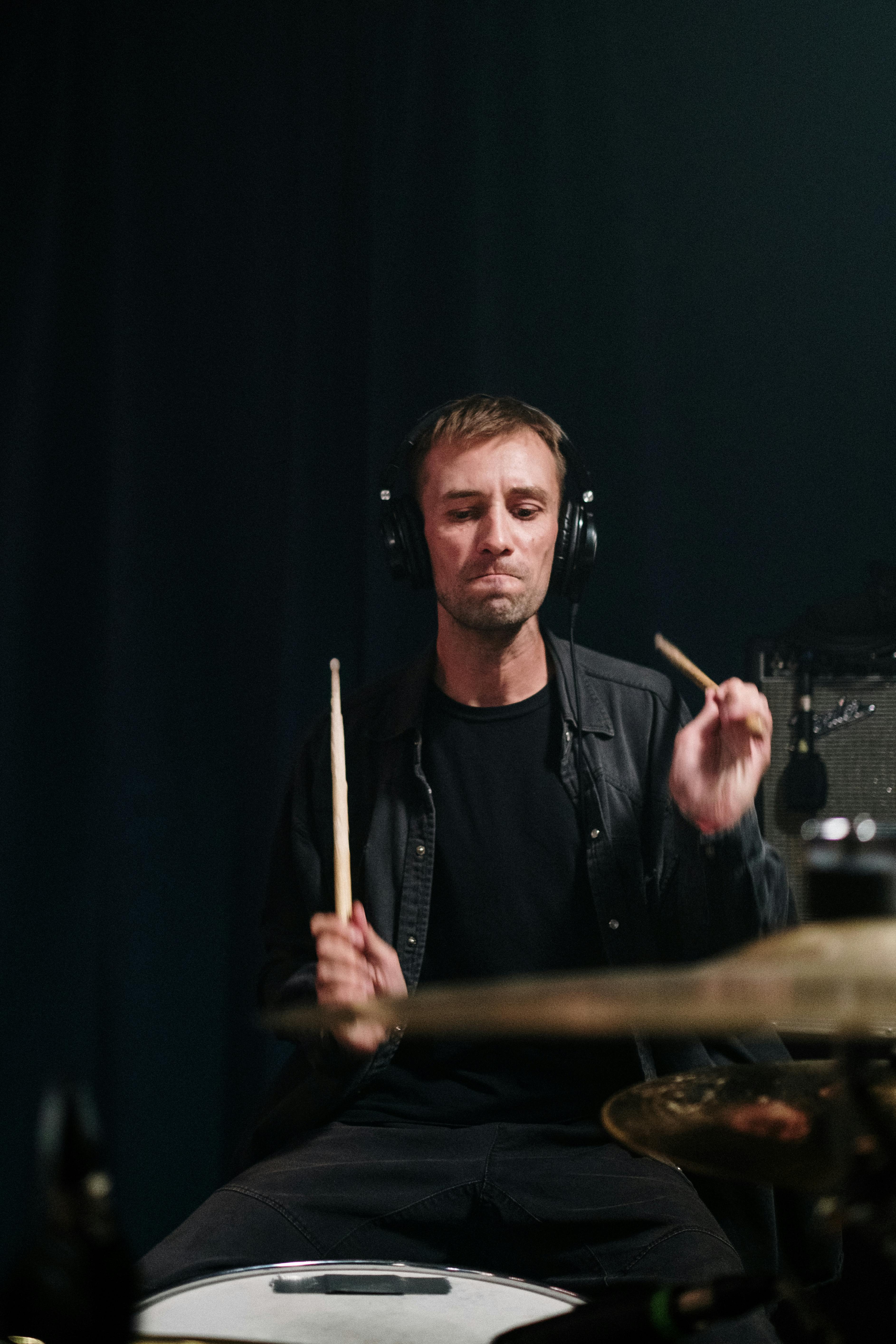 Photo of Man Playing Drums · Free Stock Photo