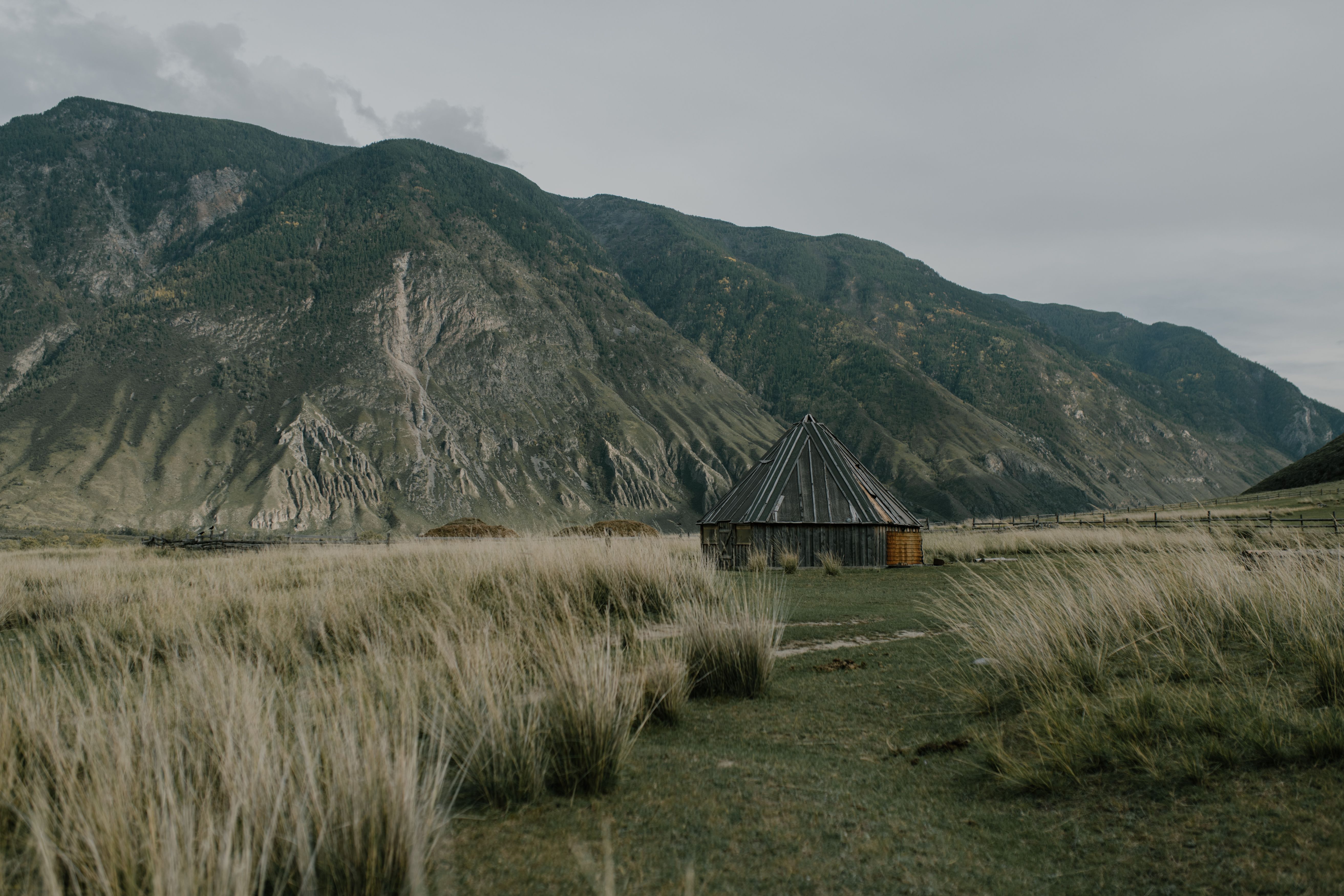 Wooden Hut in a Mountain Valley · Free Stock Photo
