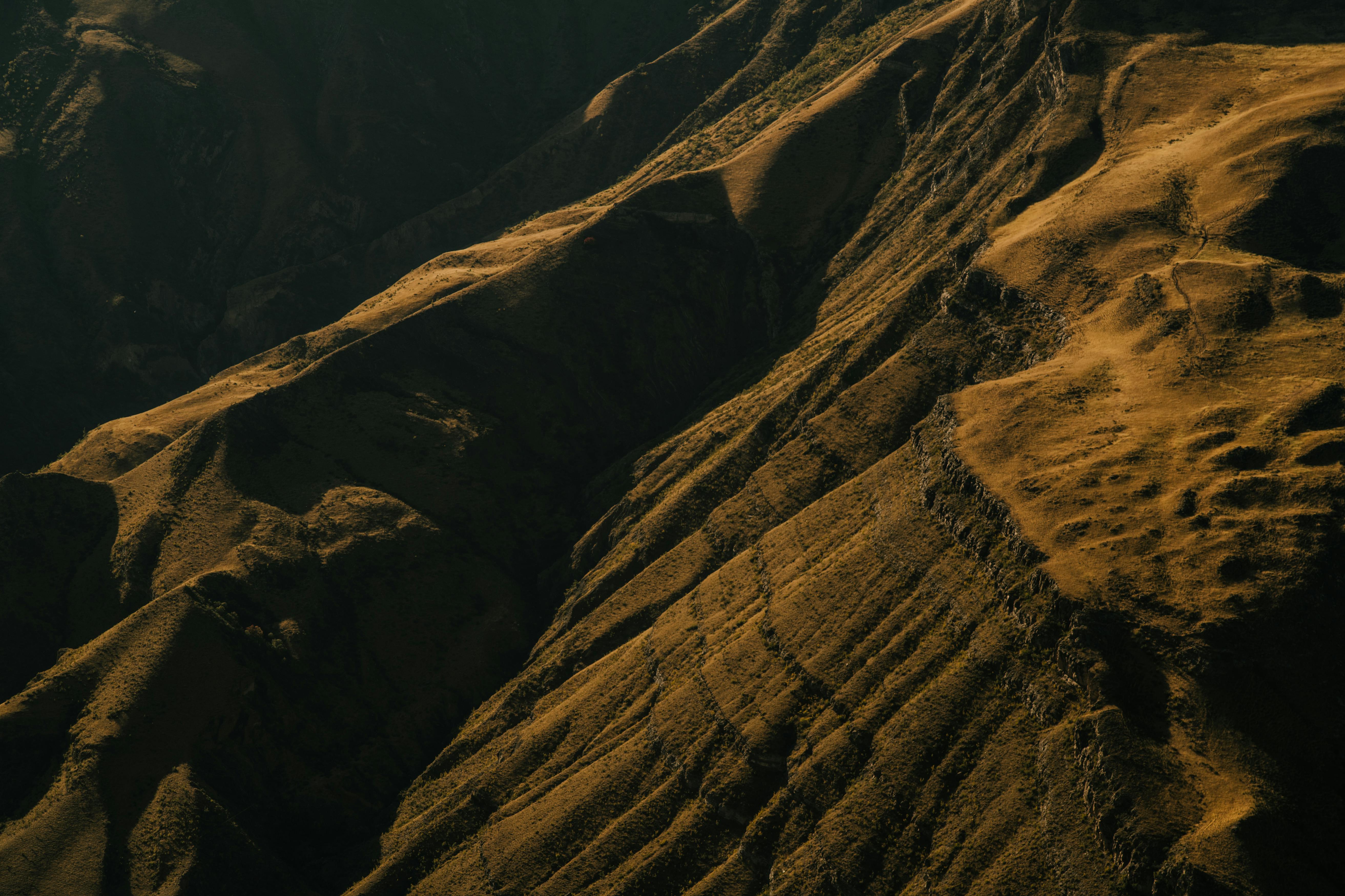 Brown Rock Mountains in Close-Up Photography · Free Stock Photo