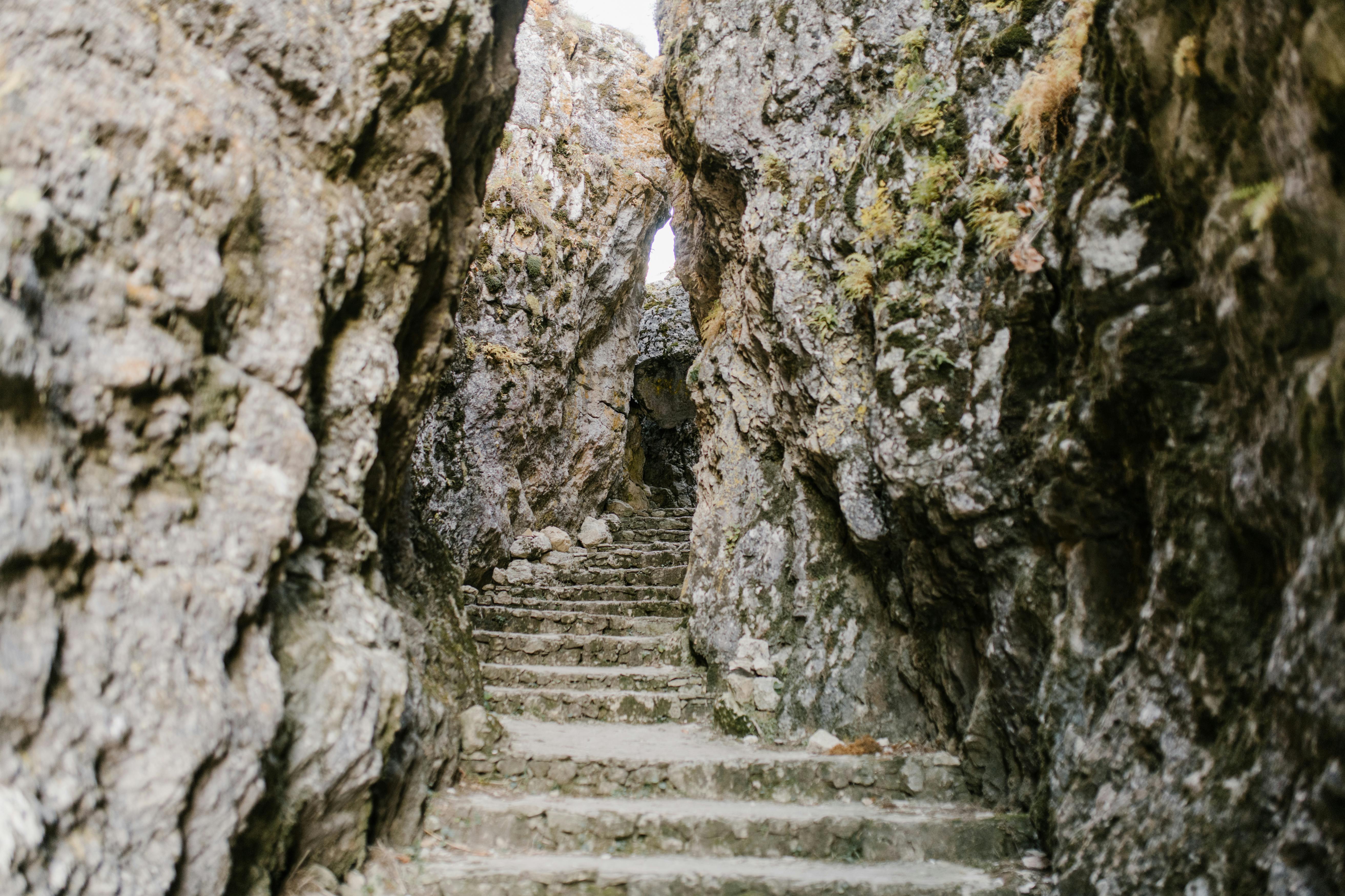 Gray Concrete Stairs Between Rock Formations · Free Stock Photo