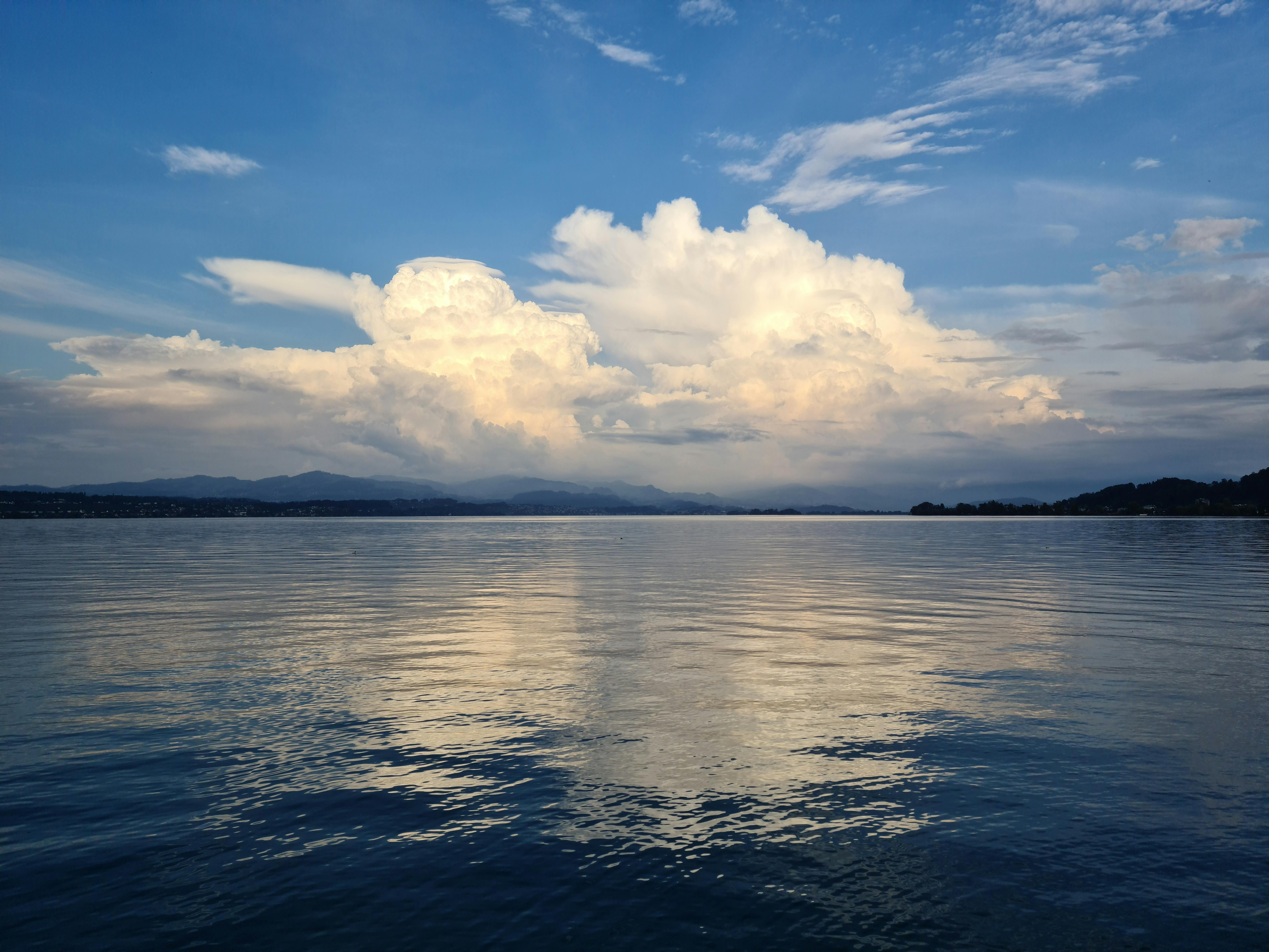 Calm Blue Sea Under the Sky · Free Stock Photo