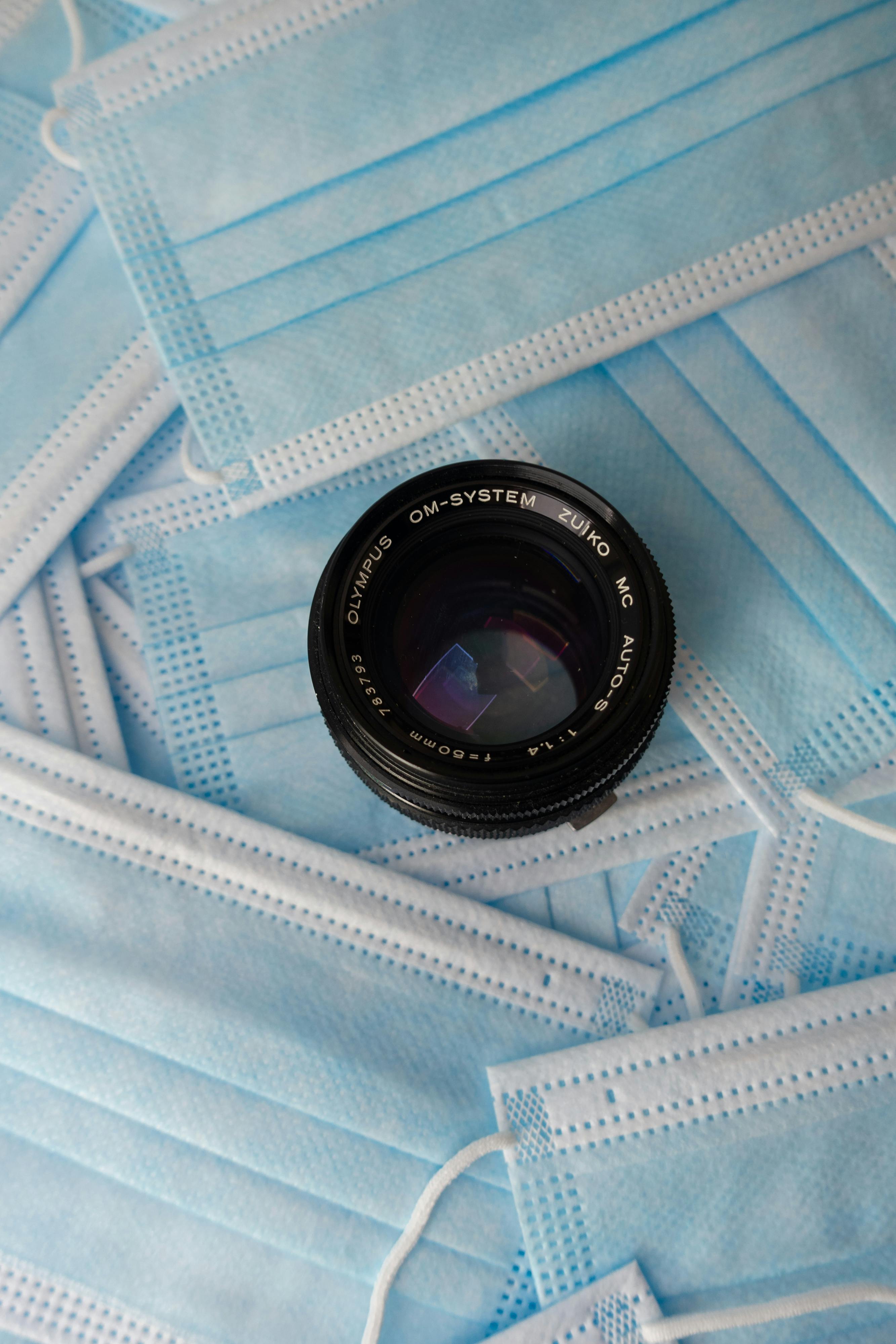 Camera Lens on Top of Face Masks · Free Stock Photo