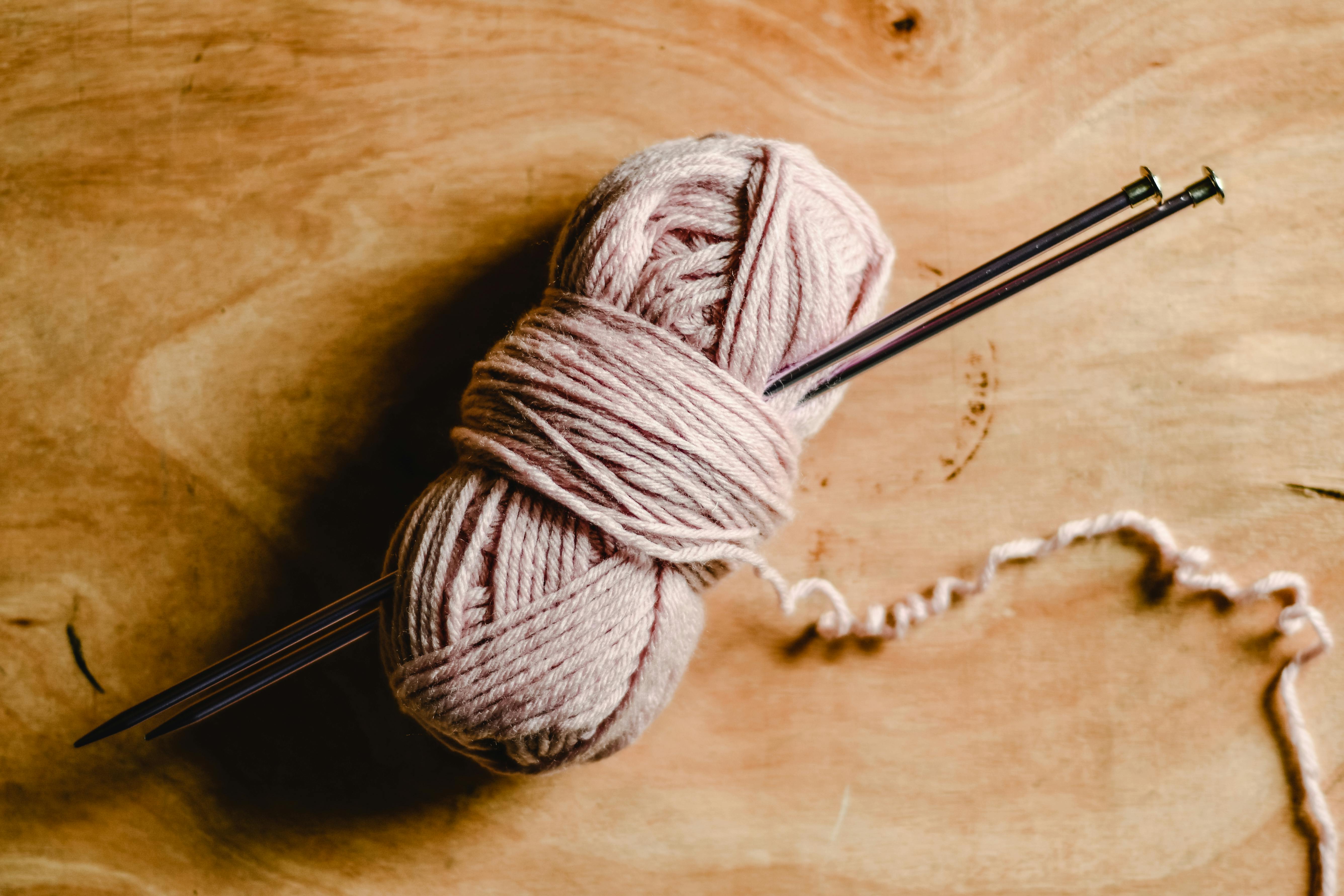 Person Holding a Knitted Handicraft · Free Stock Photo