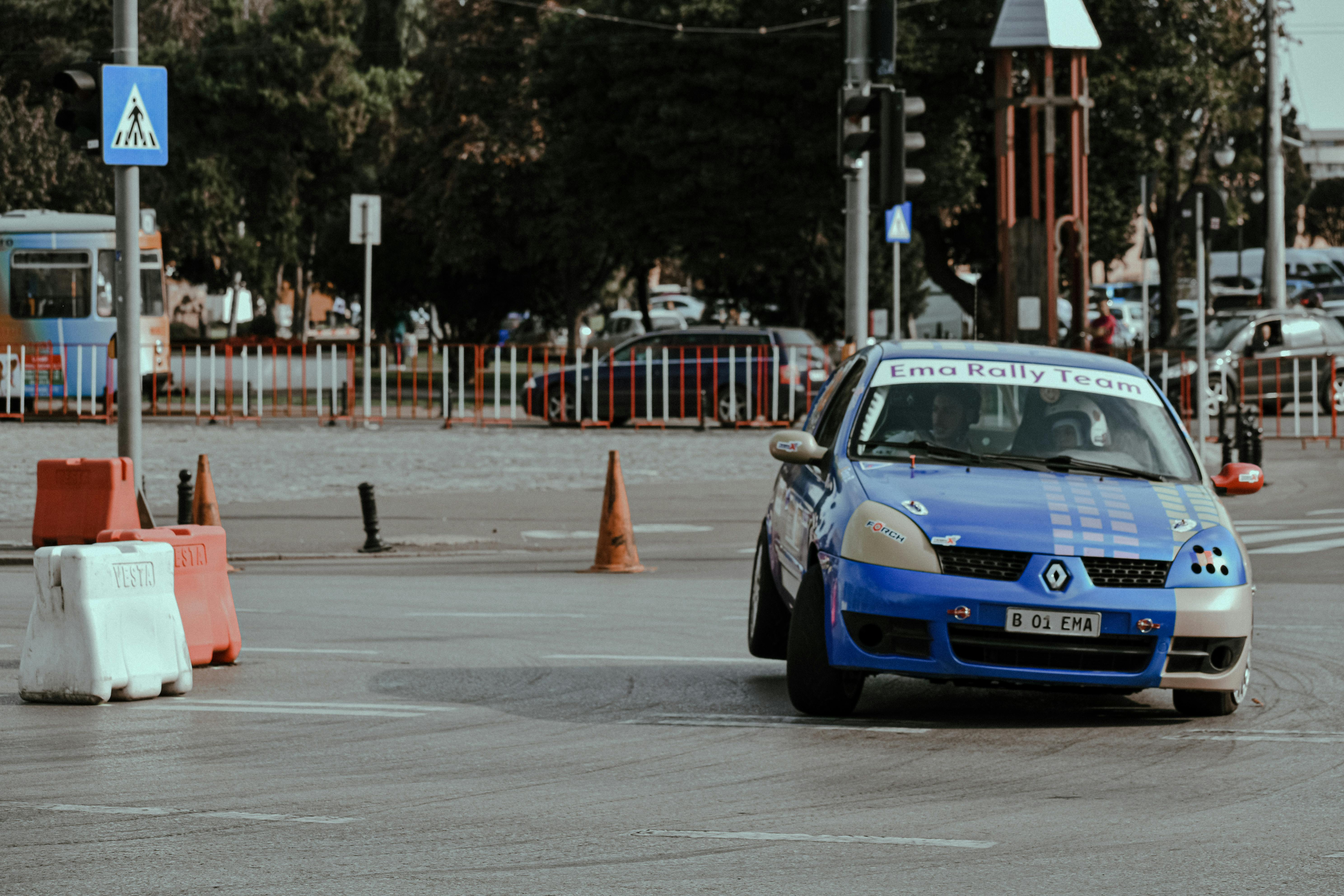 Small rally car driving in city · Free Stock Photo