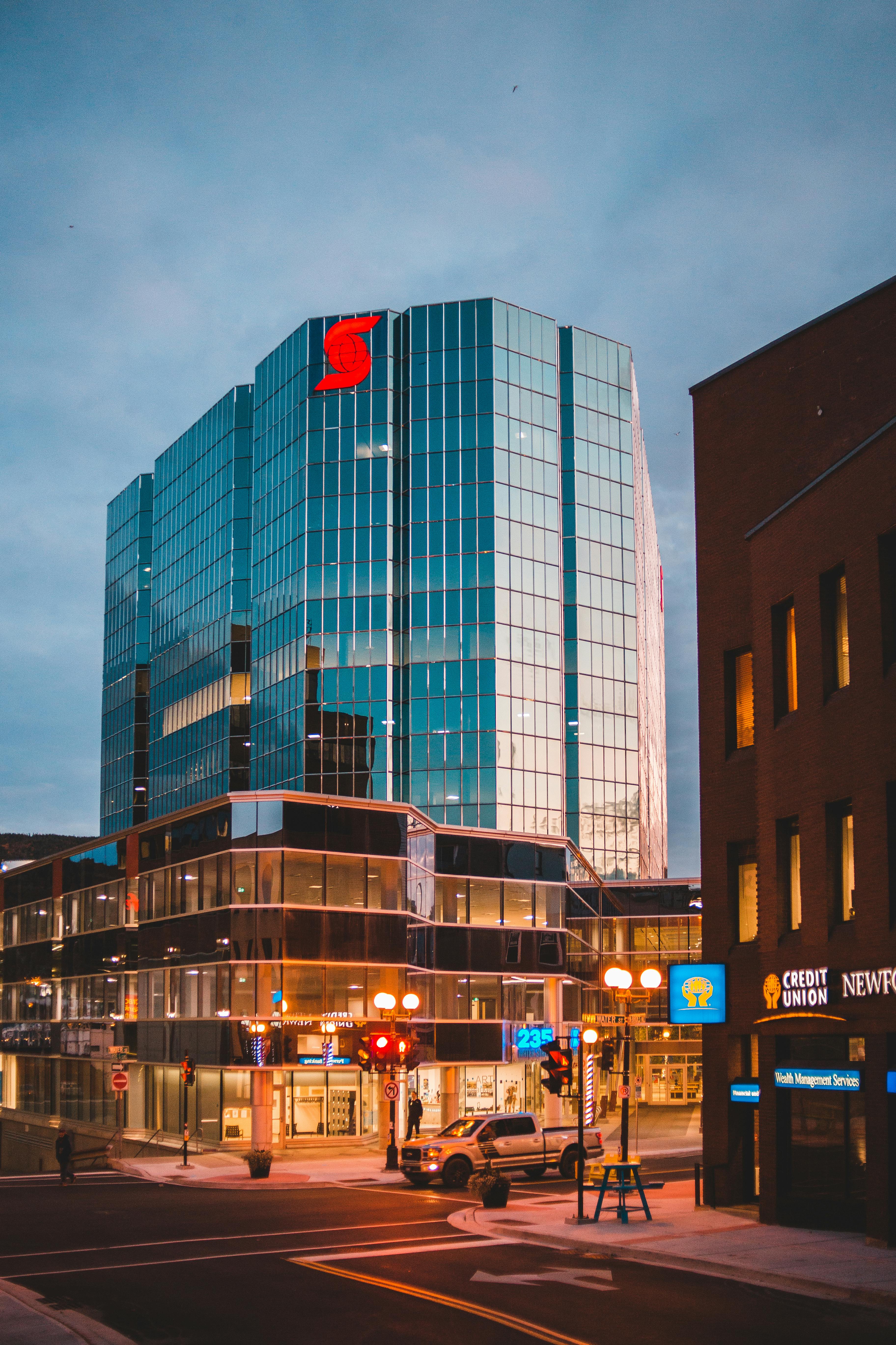 Modern city street with glowing lights · Free Stock Photo