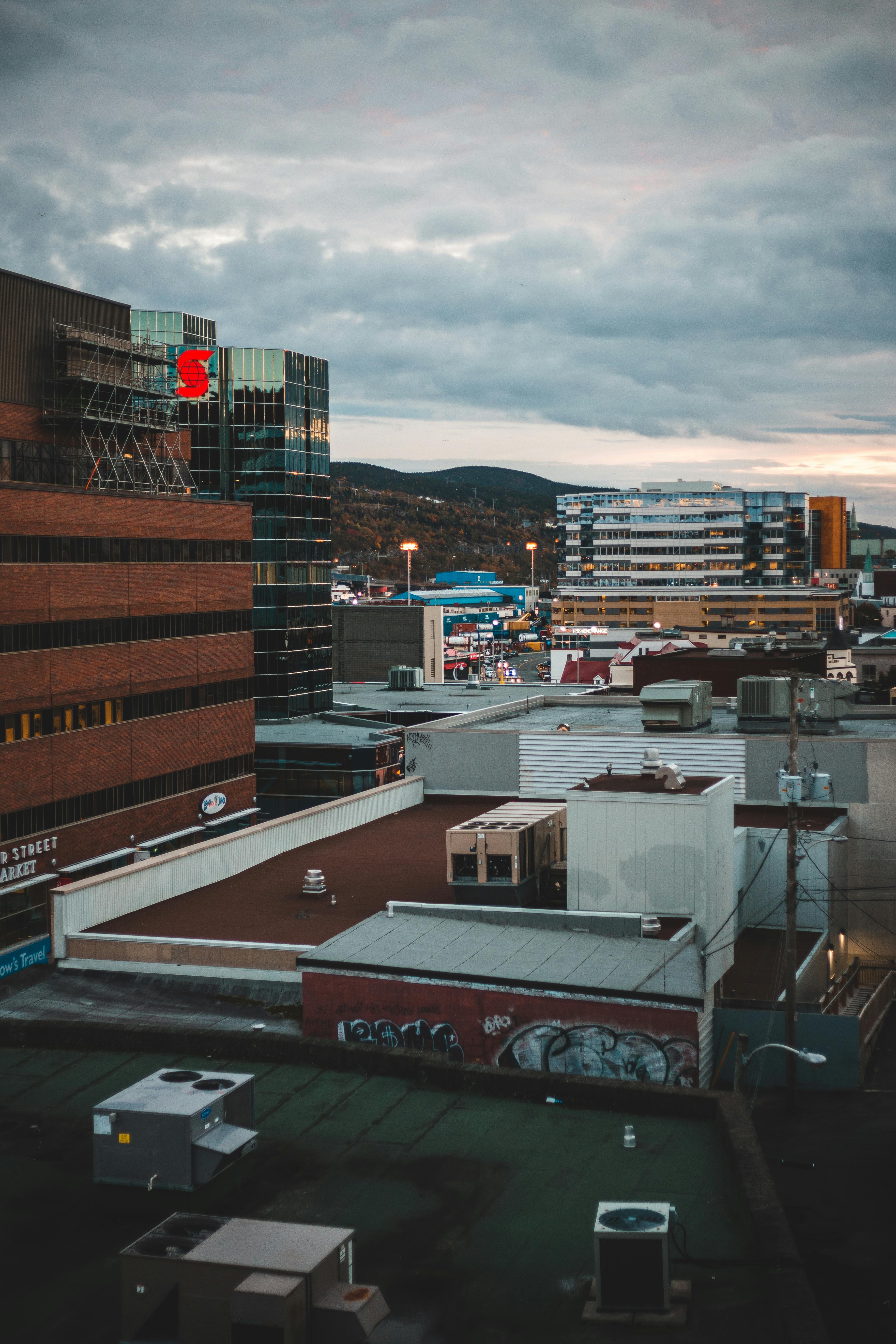 Rooftops of modern building in city · Free Stock Photo