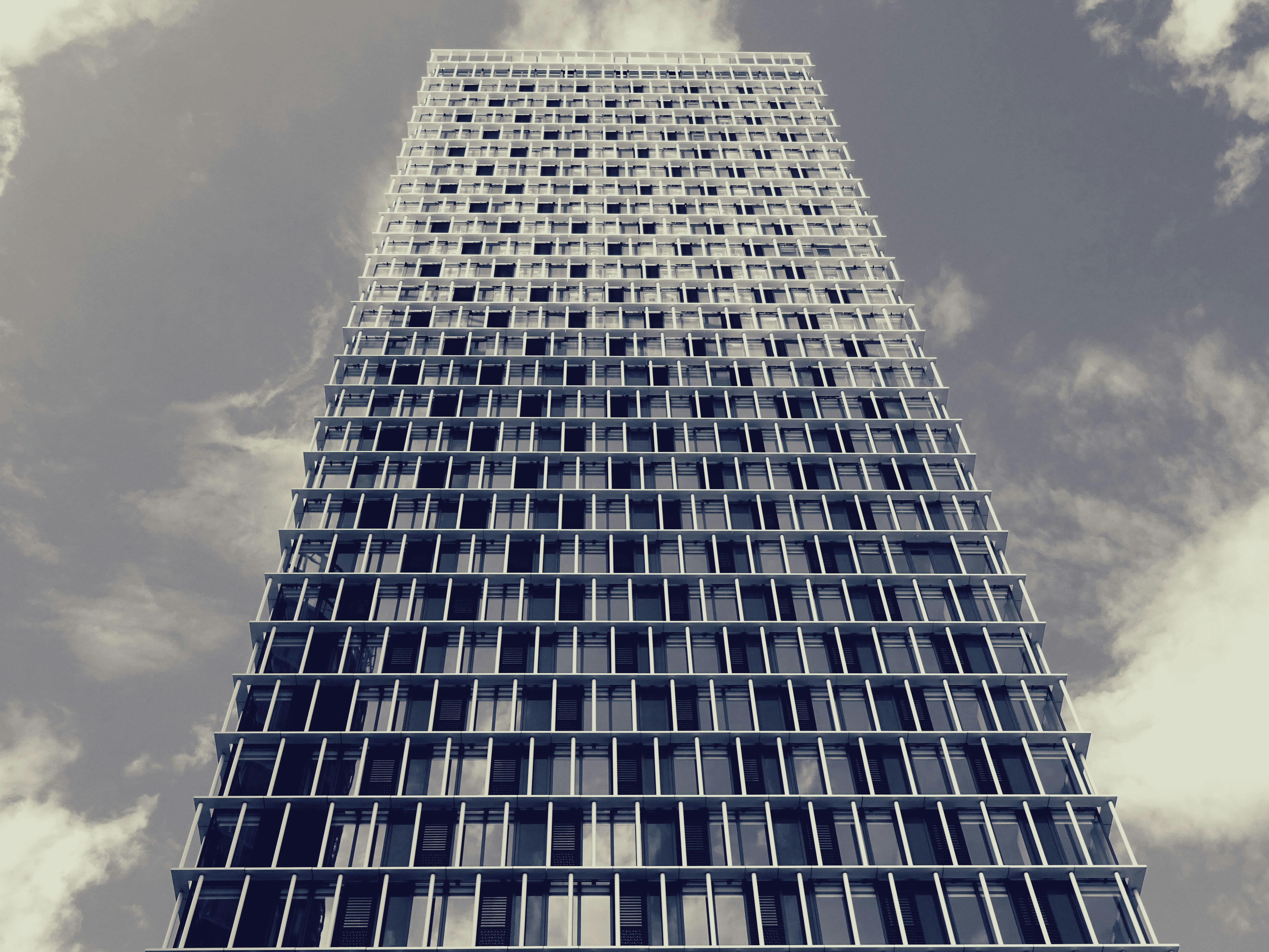 Blue Glass High-rise Building · Free Stock Photo