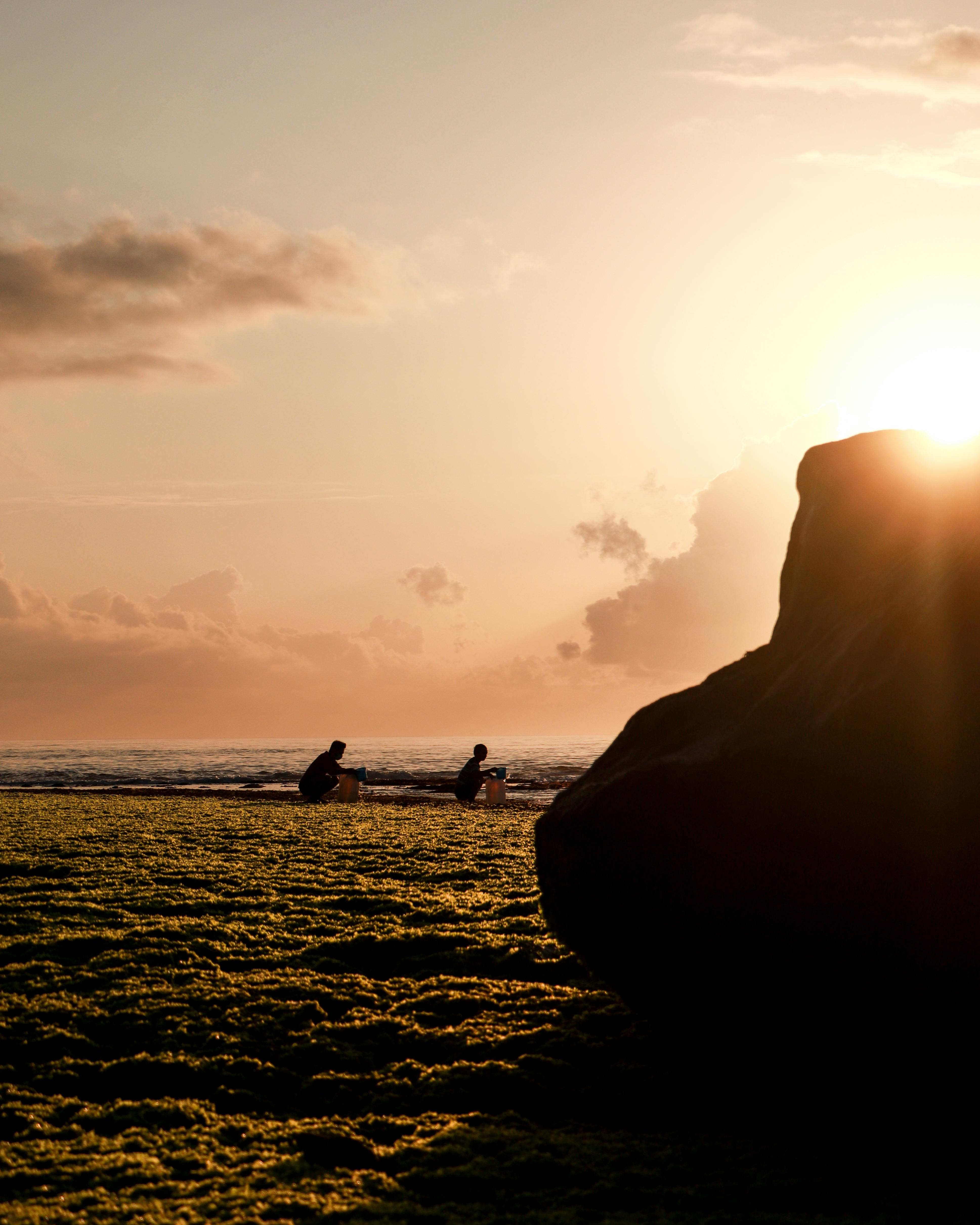 Brown and Black Lighthouse on White Rock Formation on Sea Water · Free ...