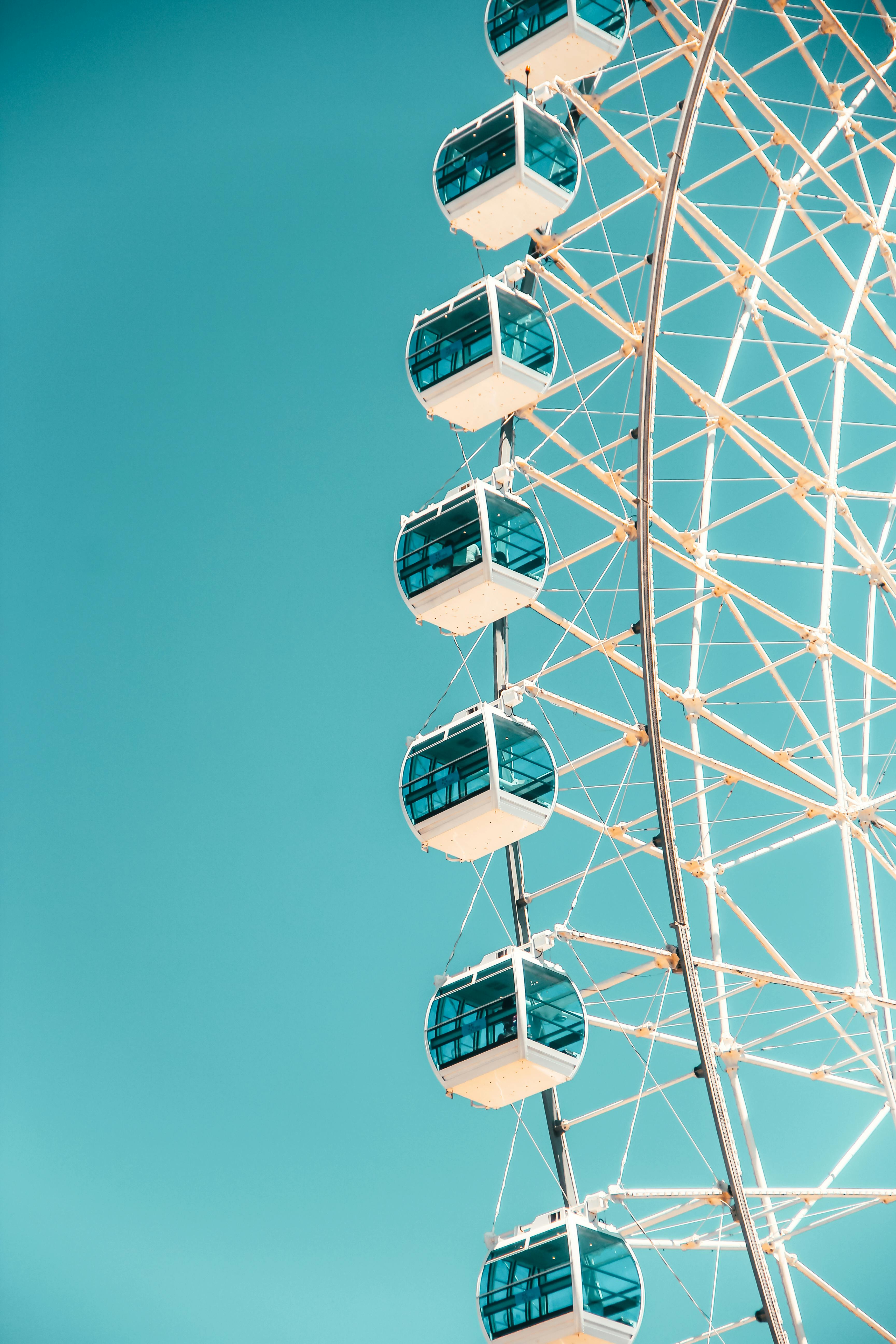 White and Blue Ferris Wheel Under Blue Sky · Free Stock Photo
