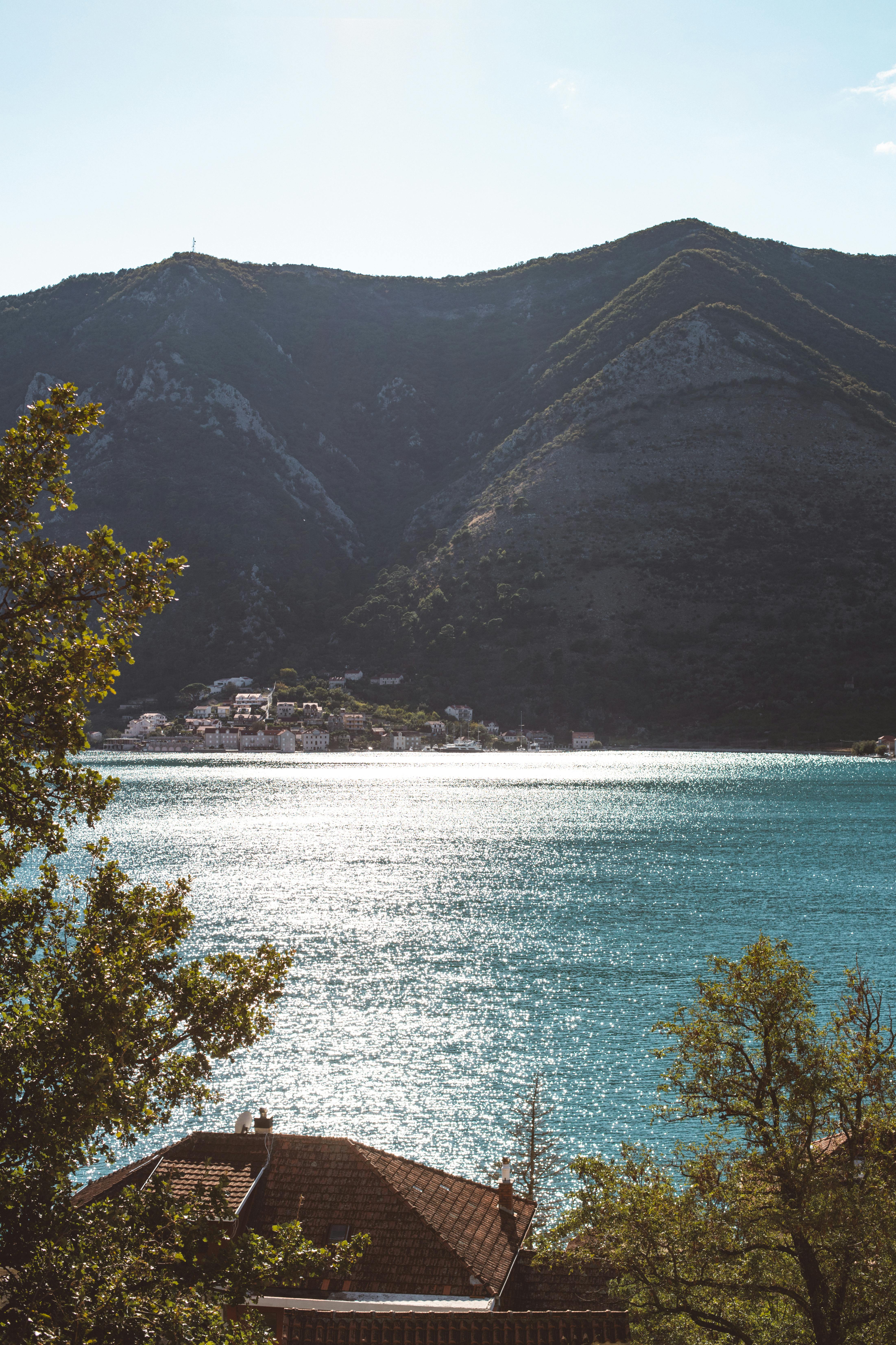 A Shack Near Snowy Mountain Ranges · Free Stock Photo