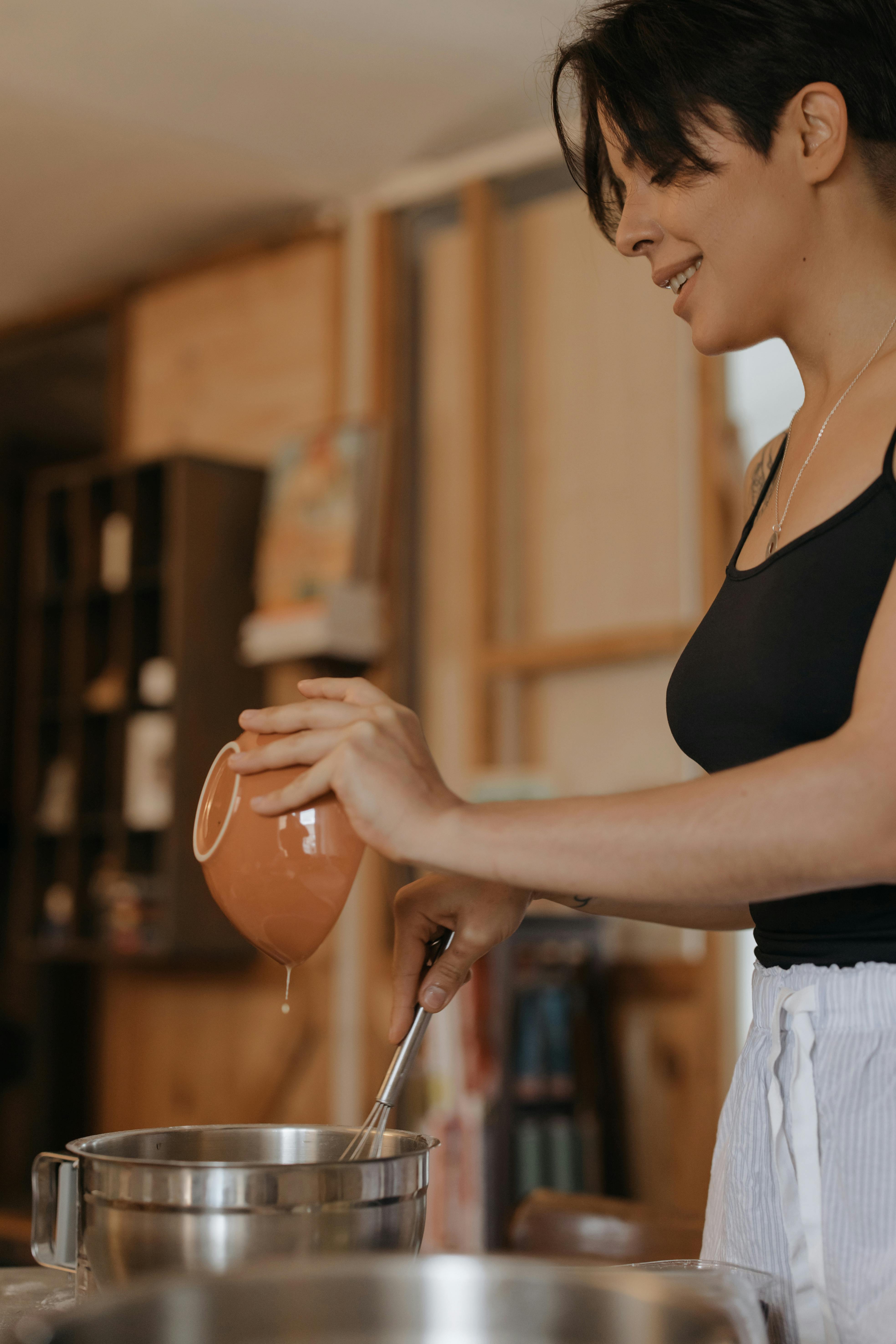 Woman Cooking in Kitchen · Free Stock Photo