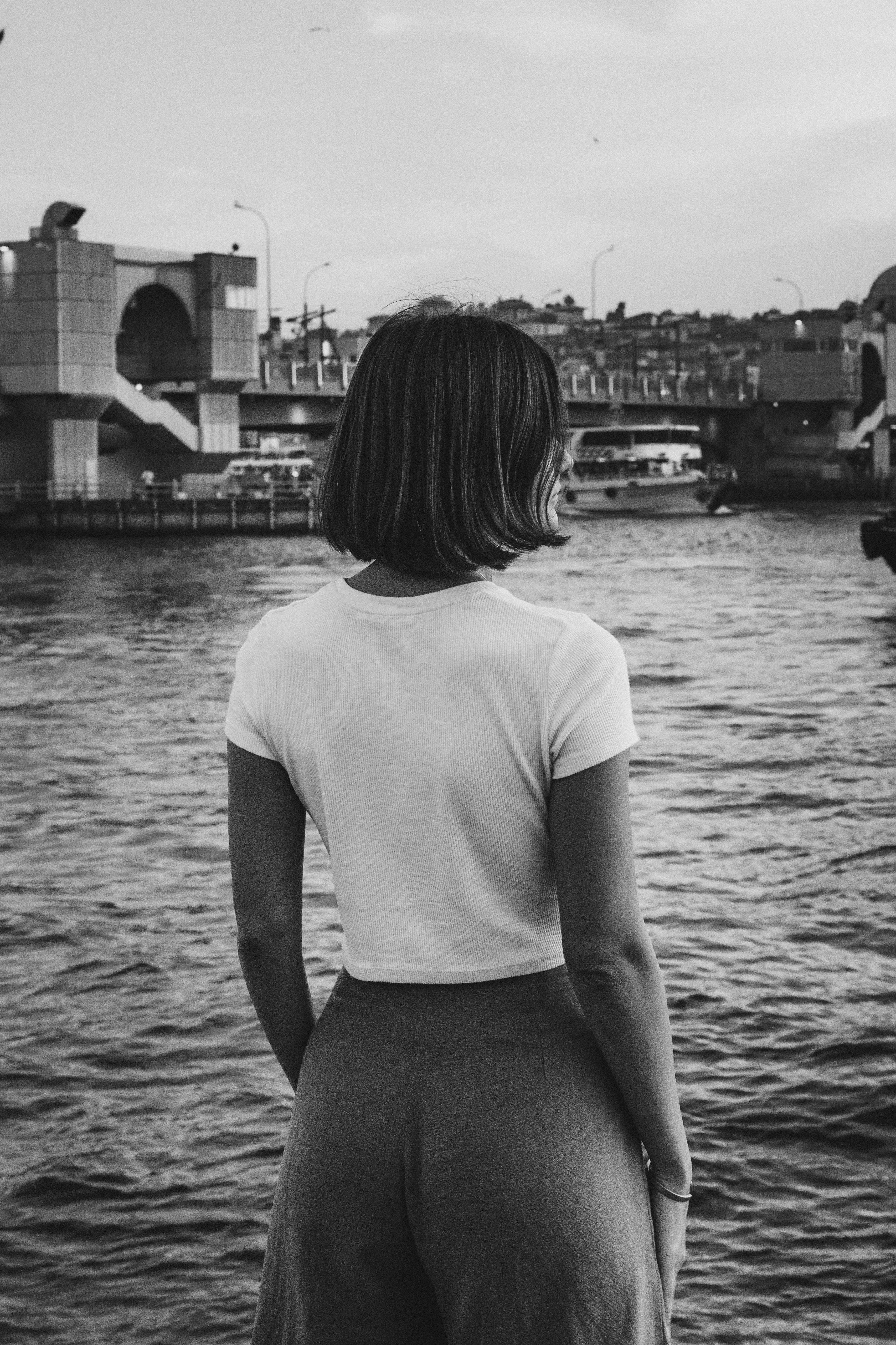 Monochrome Photo of the Back of a Woman with Short Hair · Free Stock Photo