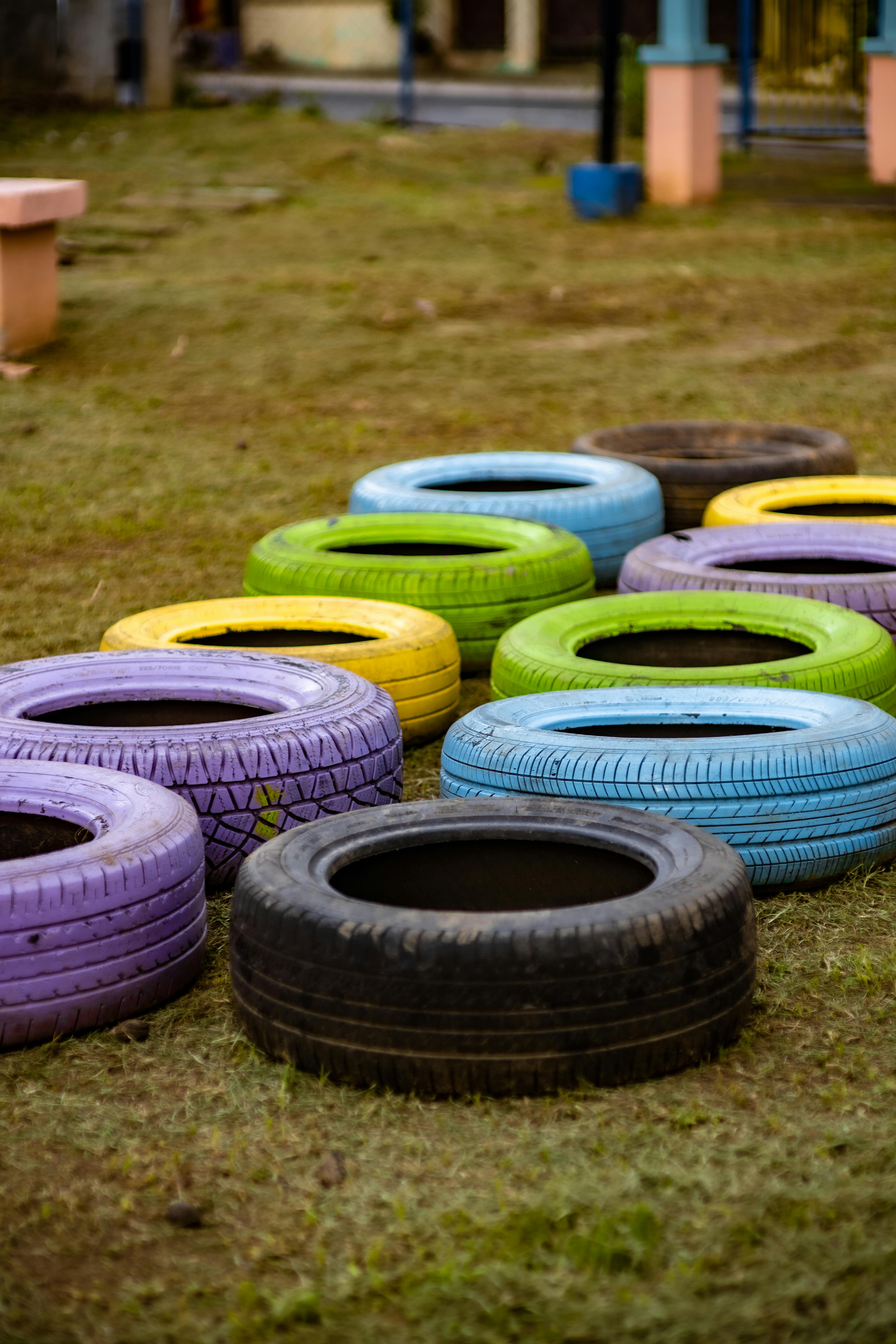 Colorful Tires on Grass · Free Stock Photo