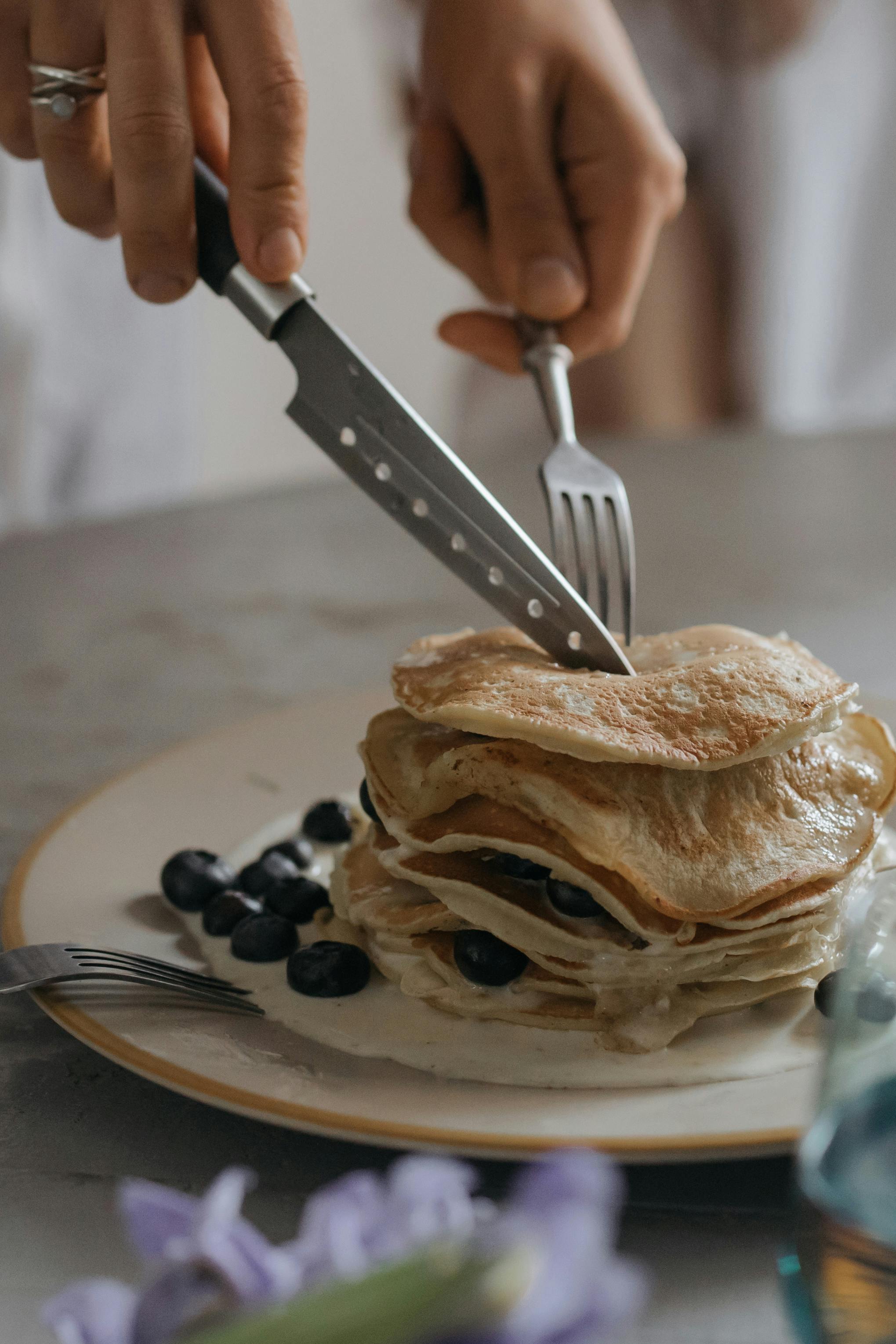 Photo of Couple Eating Pancakes · Free Stock Photo