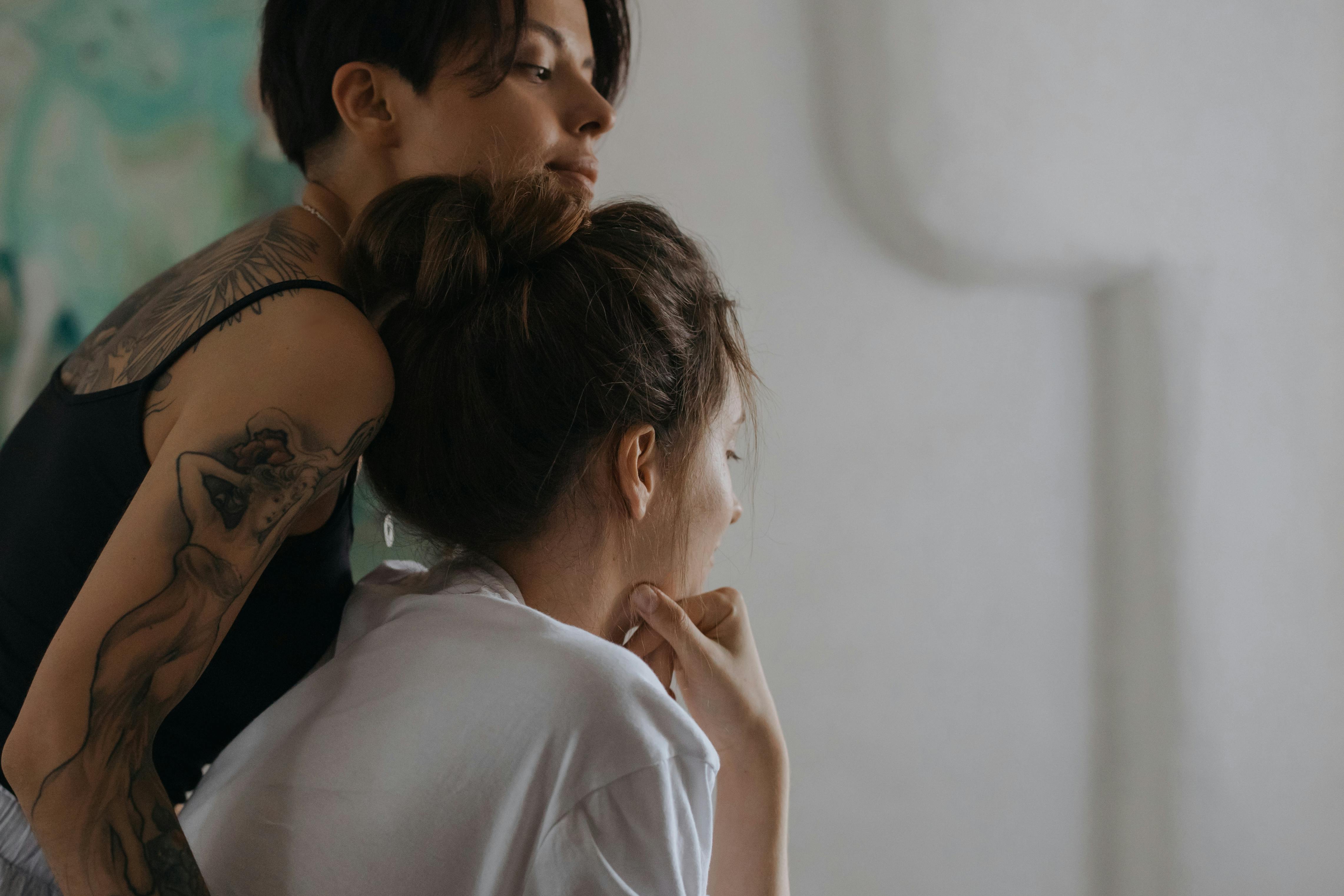 Back View of Women Hugging · Free Stock Photo