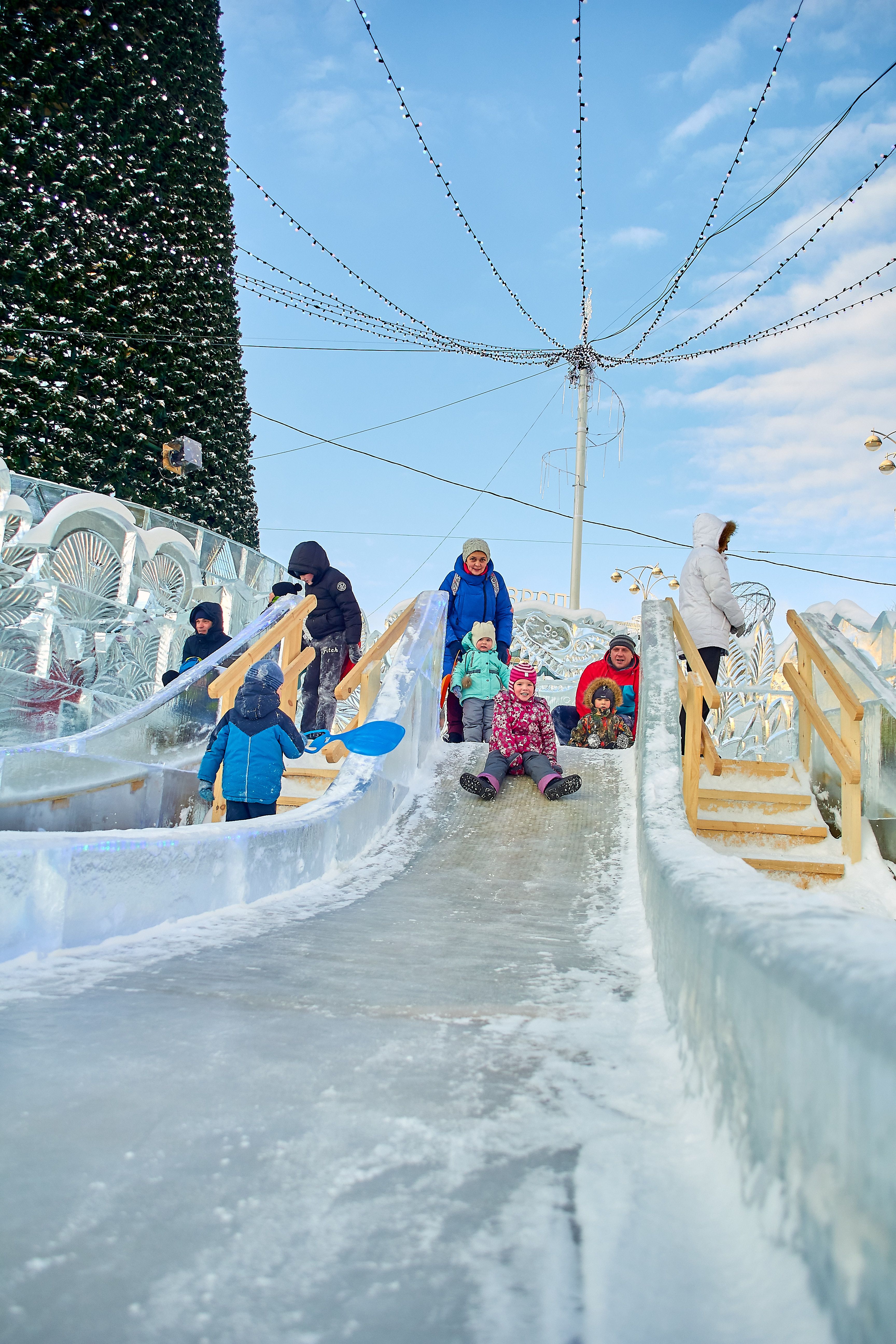 People Playing on Icy Playground · Free Stock Photo
