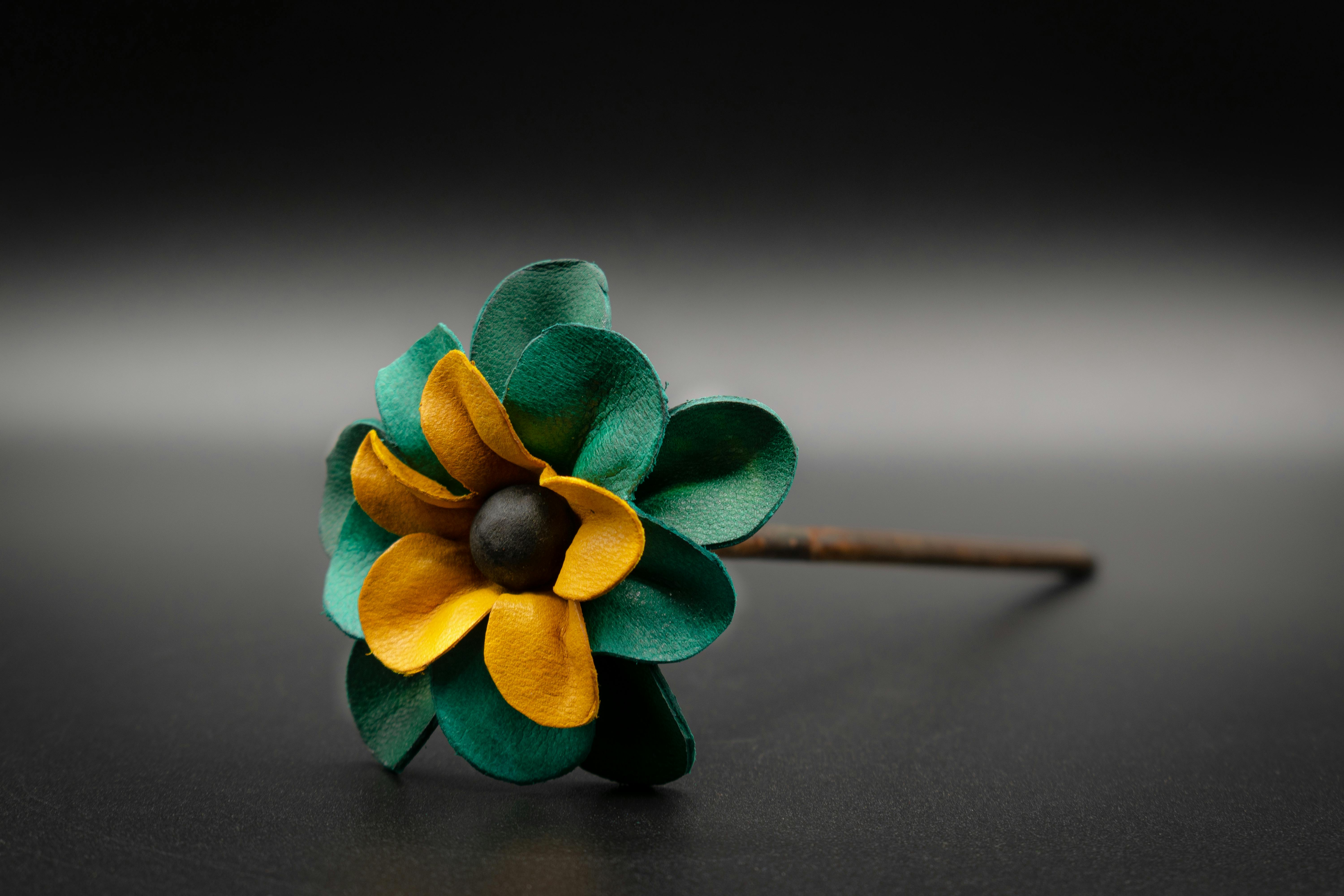 Handmade Leather Flower on Black Studio Background · Free Stock Photo