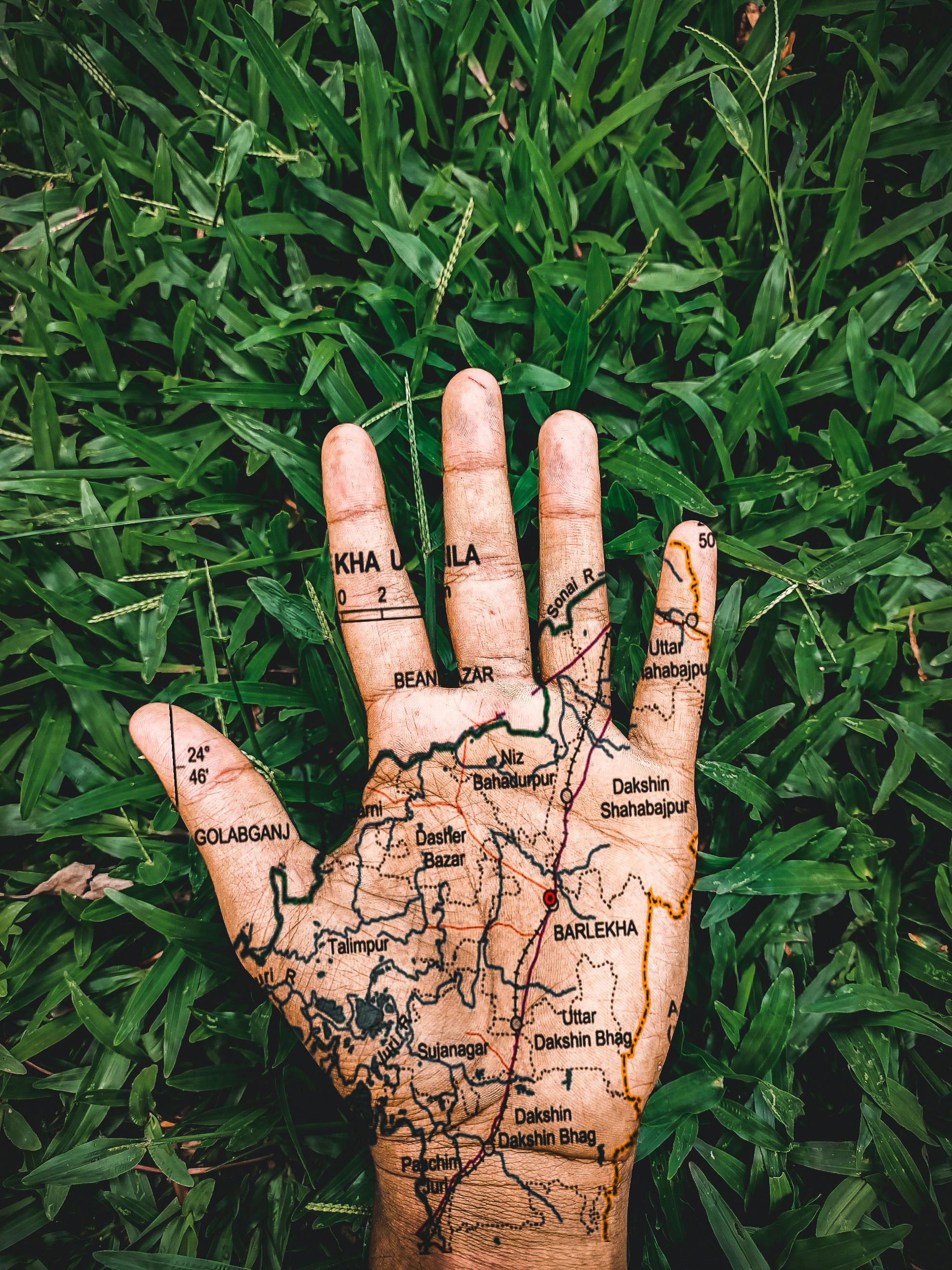 A Hand on a Map · Free Stock Photo