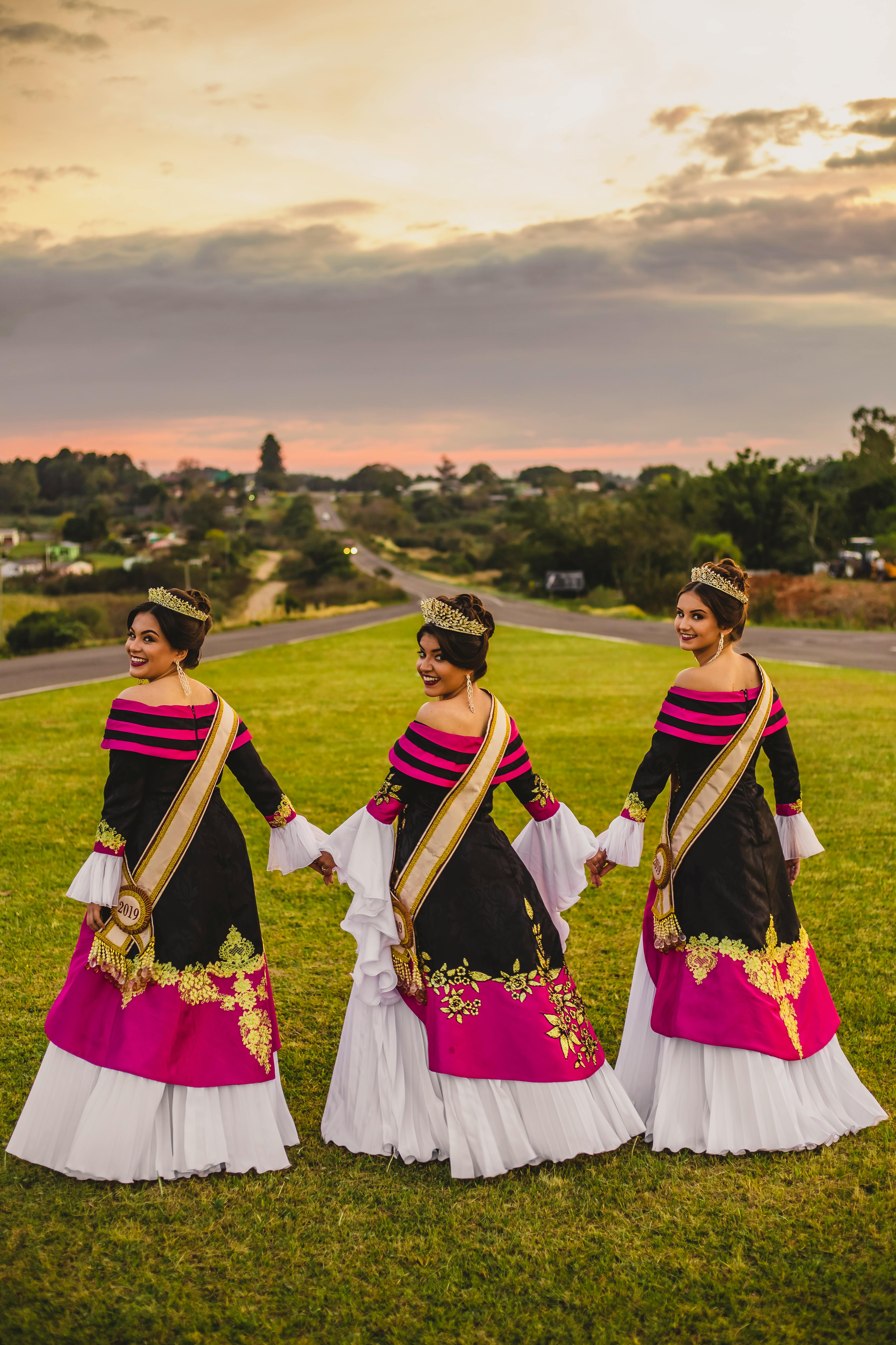 Cheerful ethnic beauty contest winner in elegant wear in park · Free ...