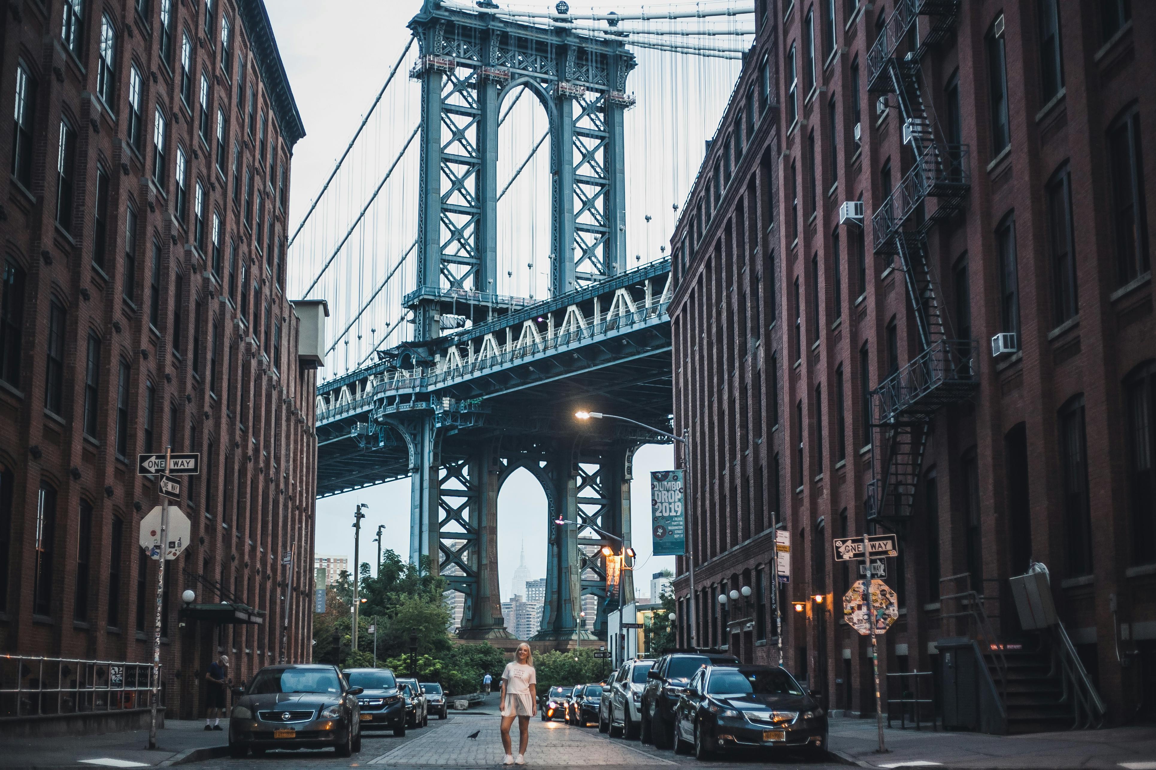 Manhattan Bridge Seen Between Buildings · Free Stock Photo