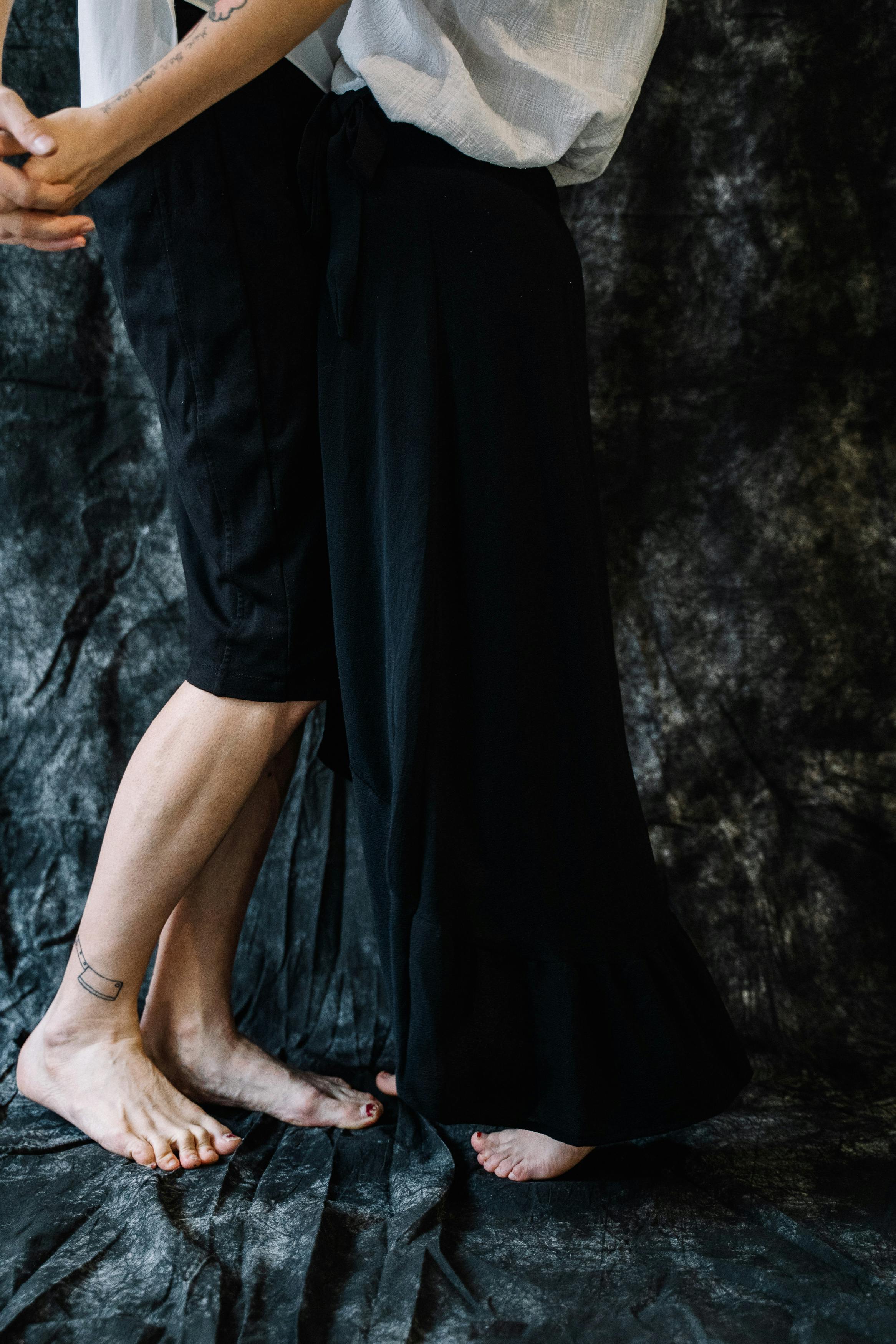 A Woman Sitting on Floor Hugging Leg · Free Stock Photo