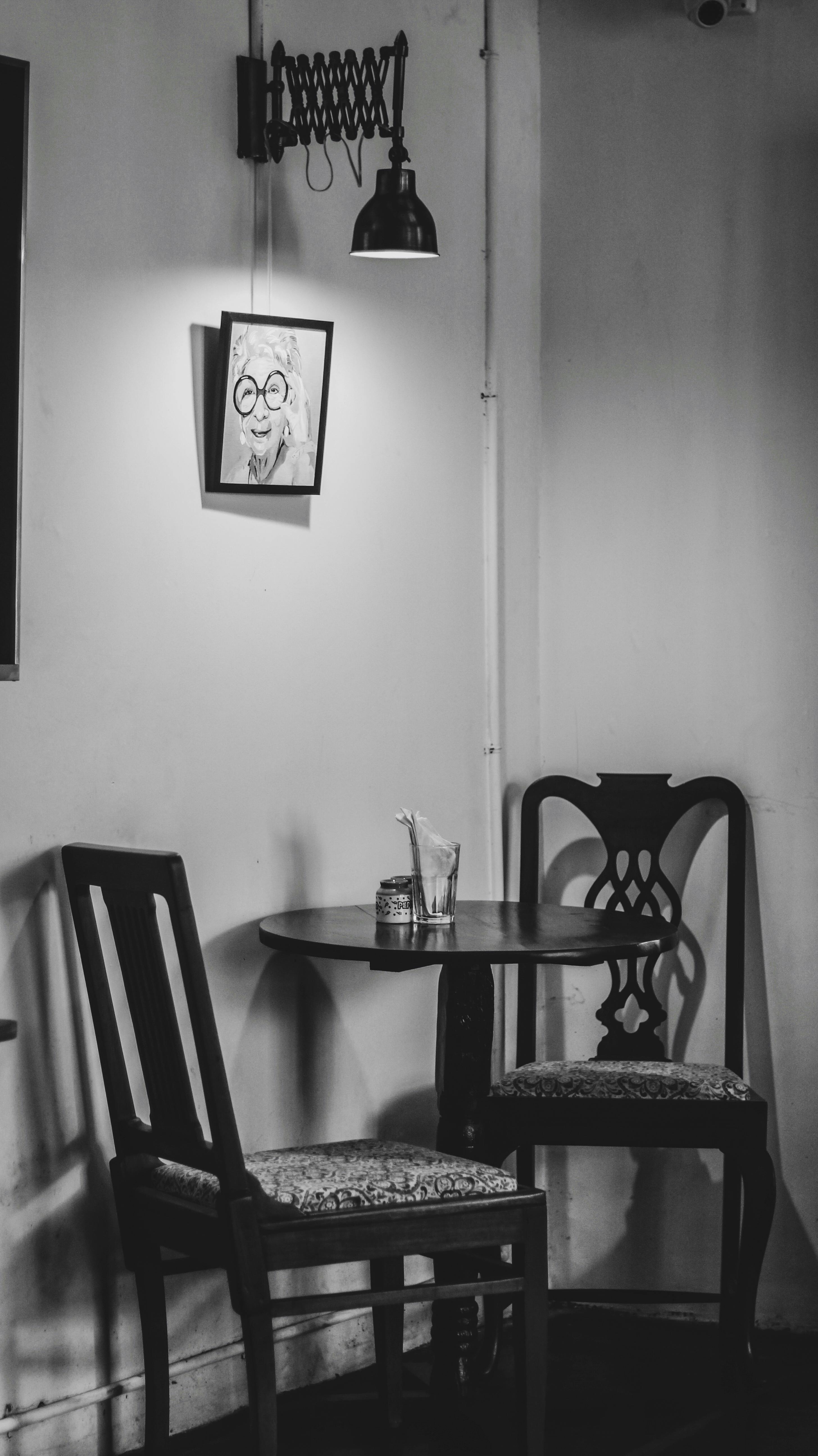 Grayscale Photography Of Inside A Coffee Shop · Free Stock Photo
