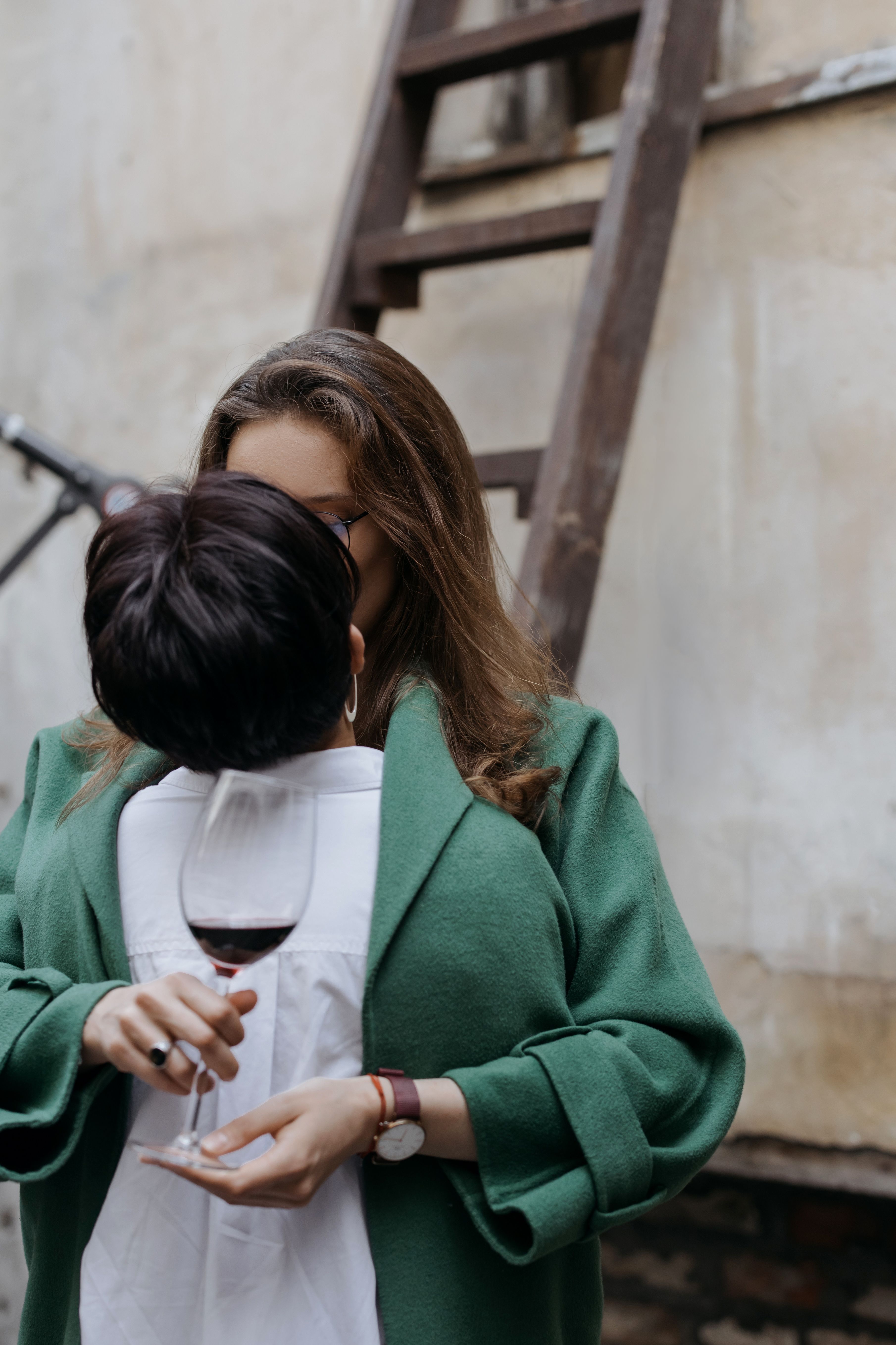 Back View of a Couple Kissing Each Other · Free Stock Photo