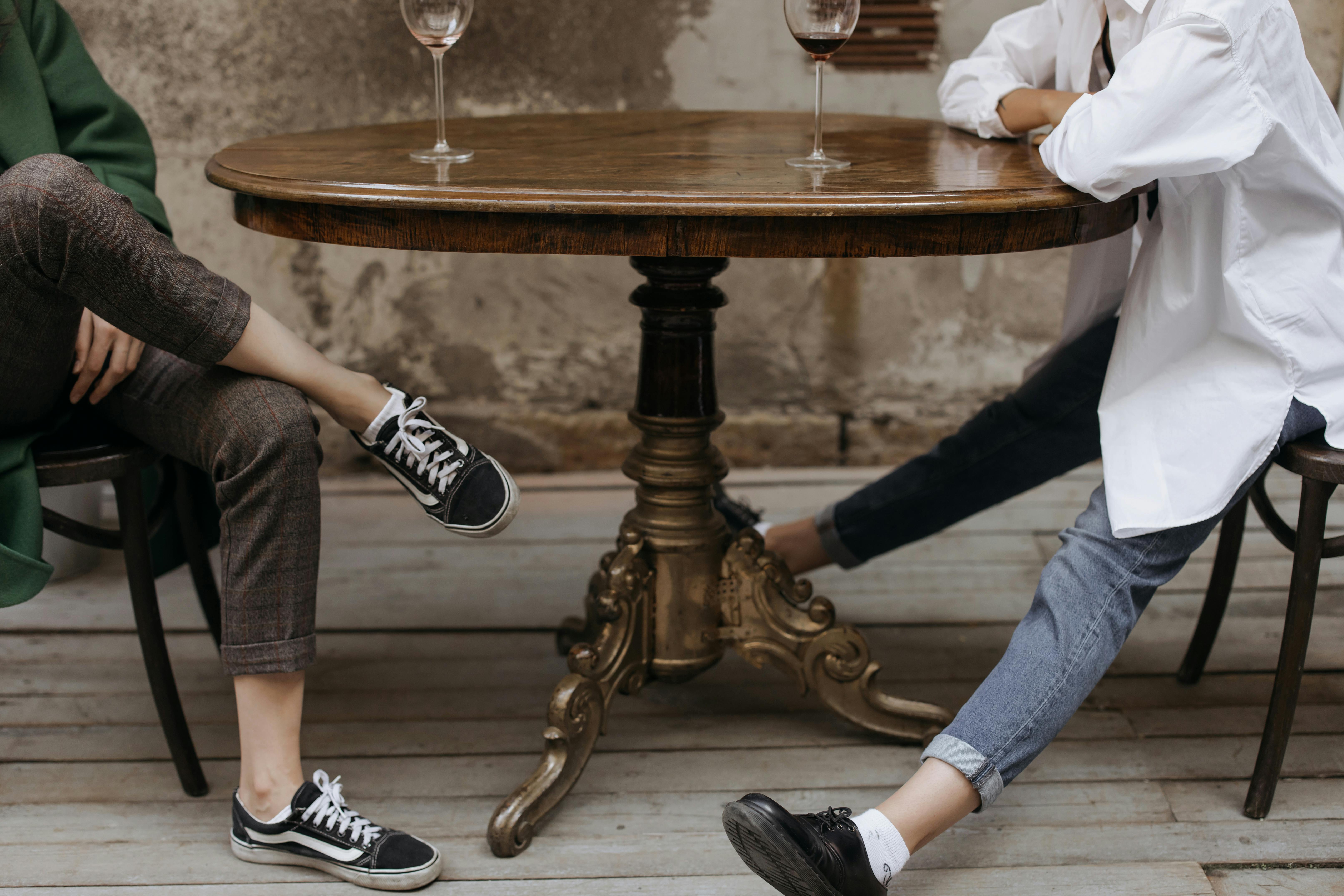Two Women Sitting at the Table · Free Stock Photo