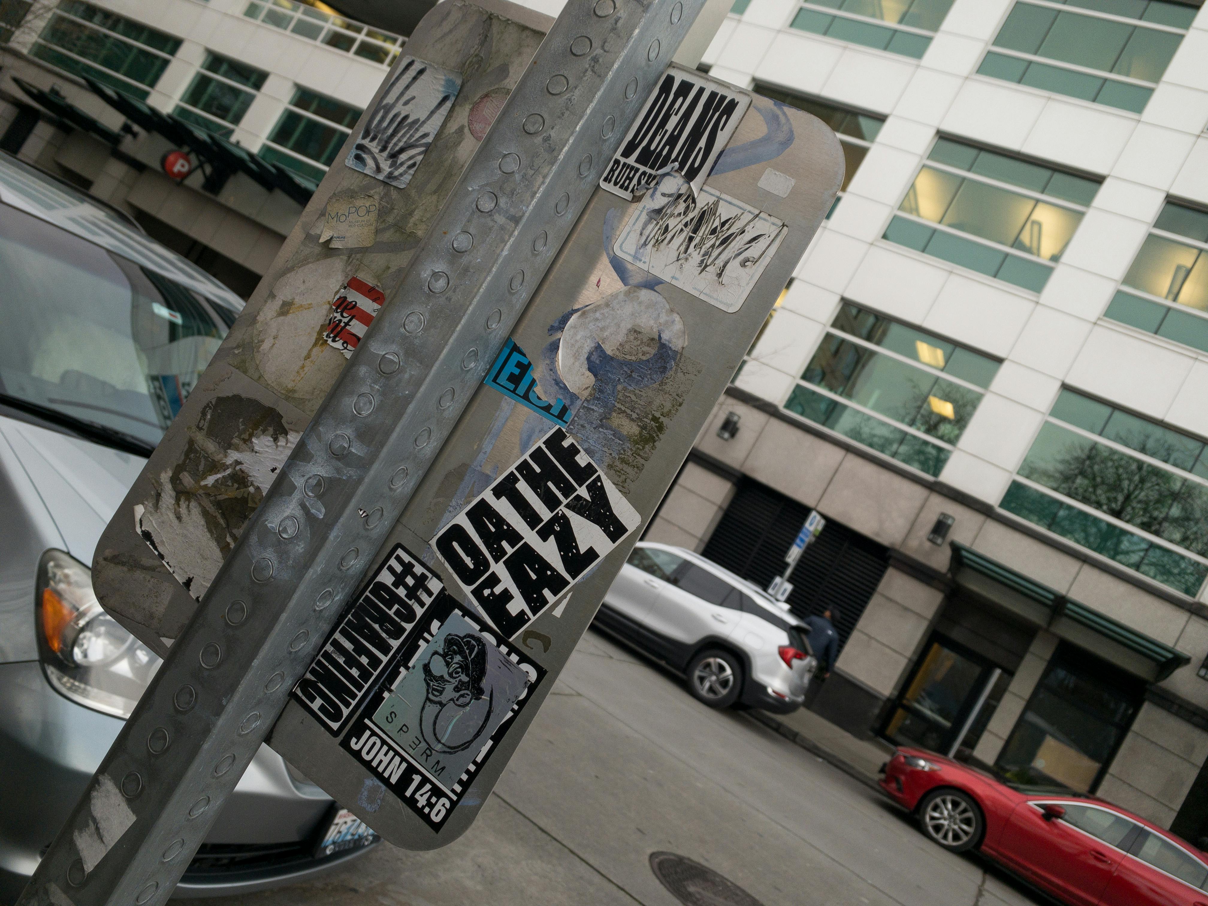 White and Black Stickers on the Back of Signage on the Street · Free ...