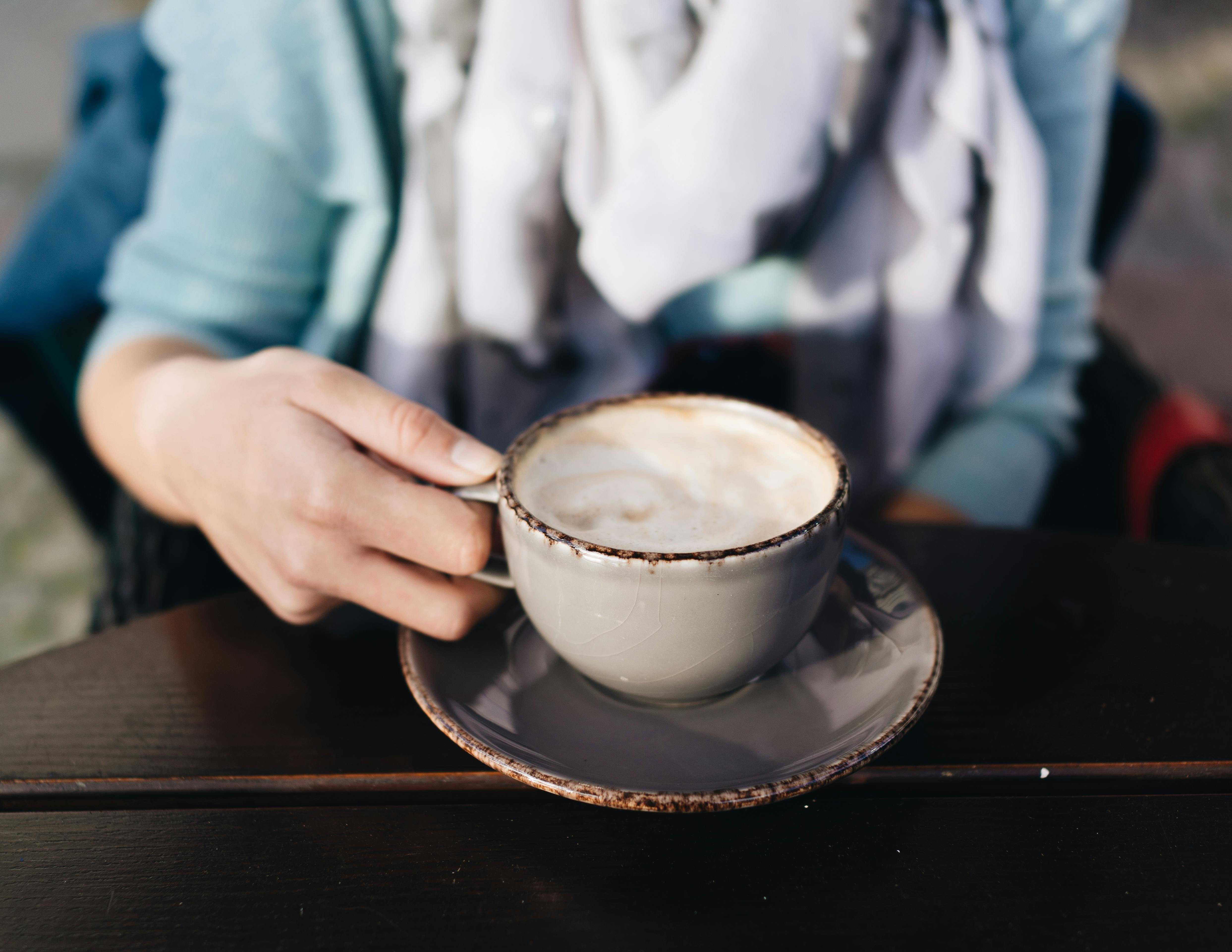 Person Holding White Ceramic Cup · Free Stock Photo