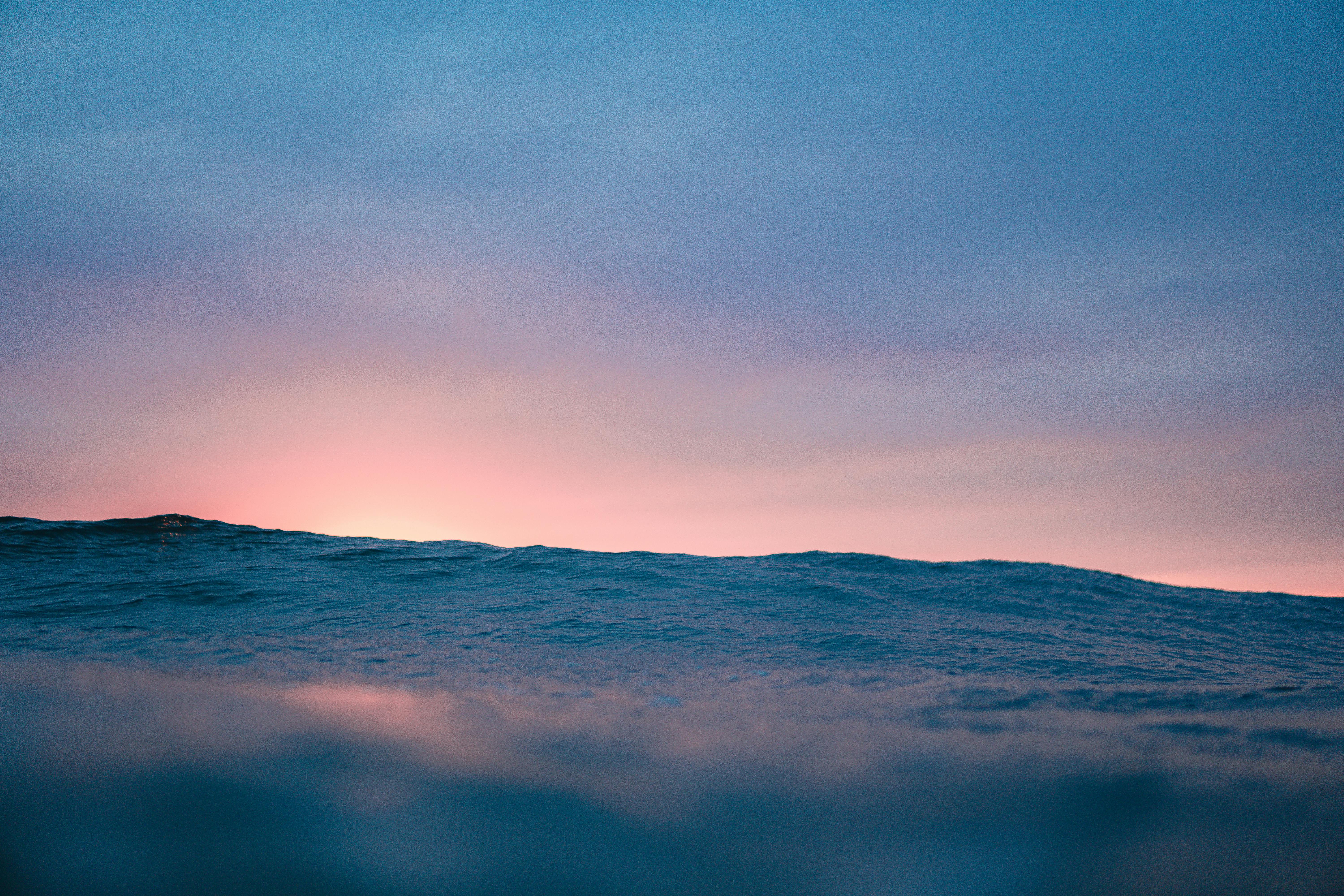 Rippling water of sea at dusk · Free Stock Photo