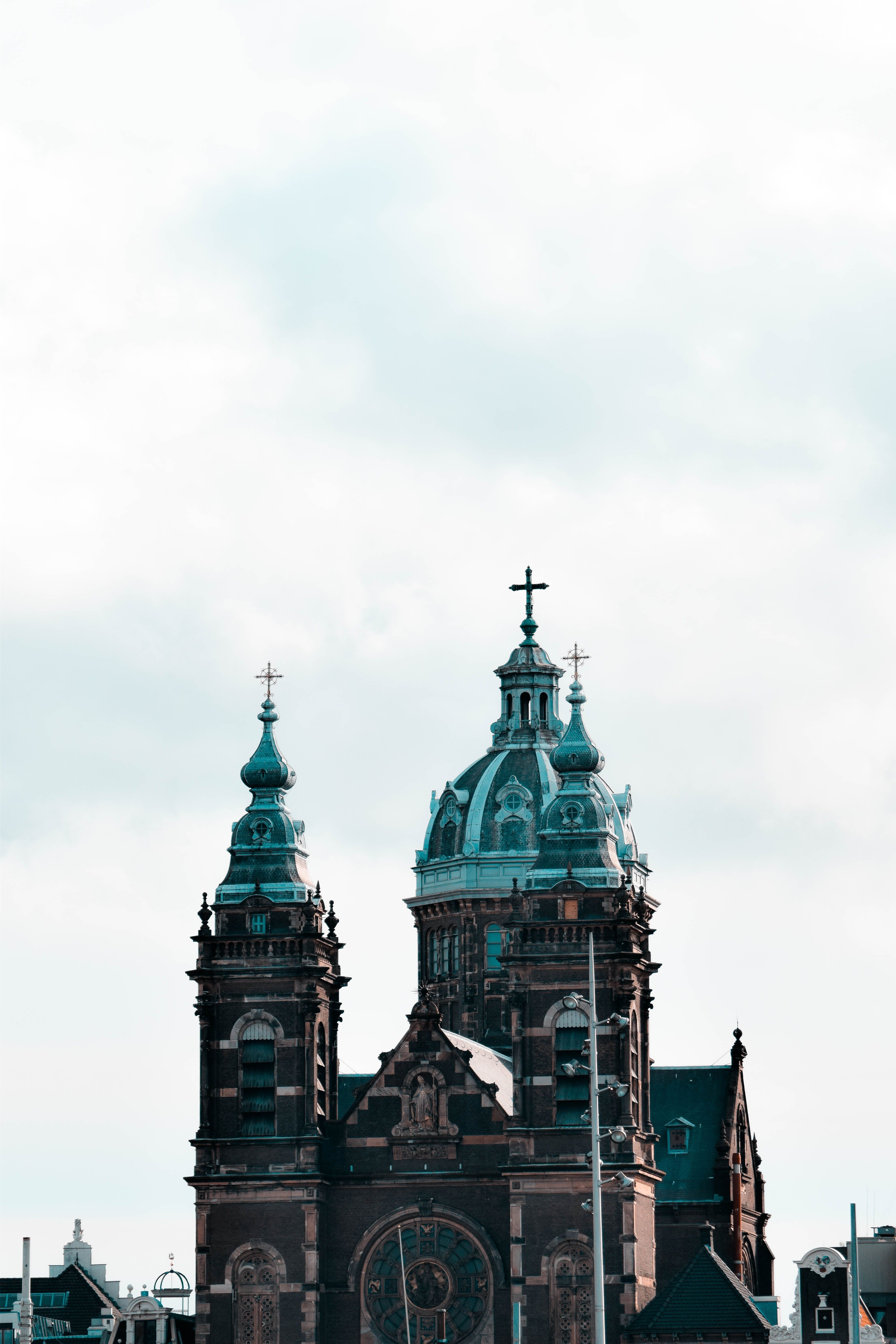Photo of a Church against a Cloudy Sky · Free Stock Photo