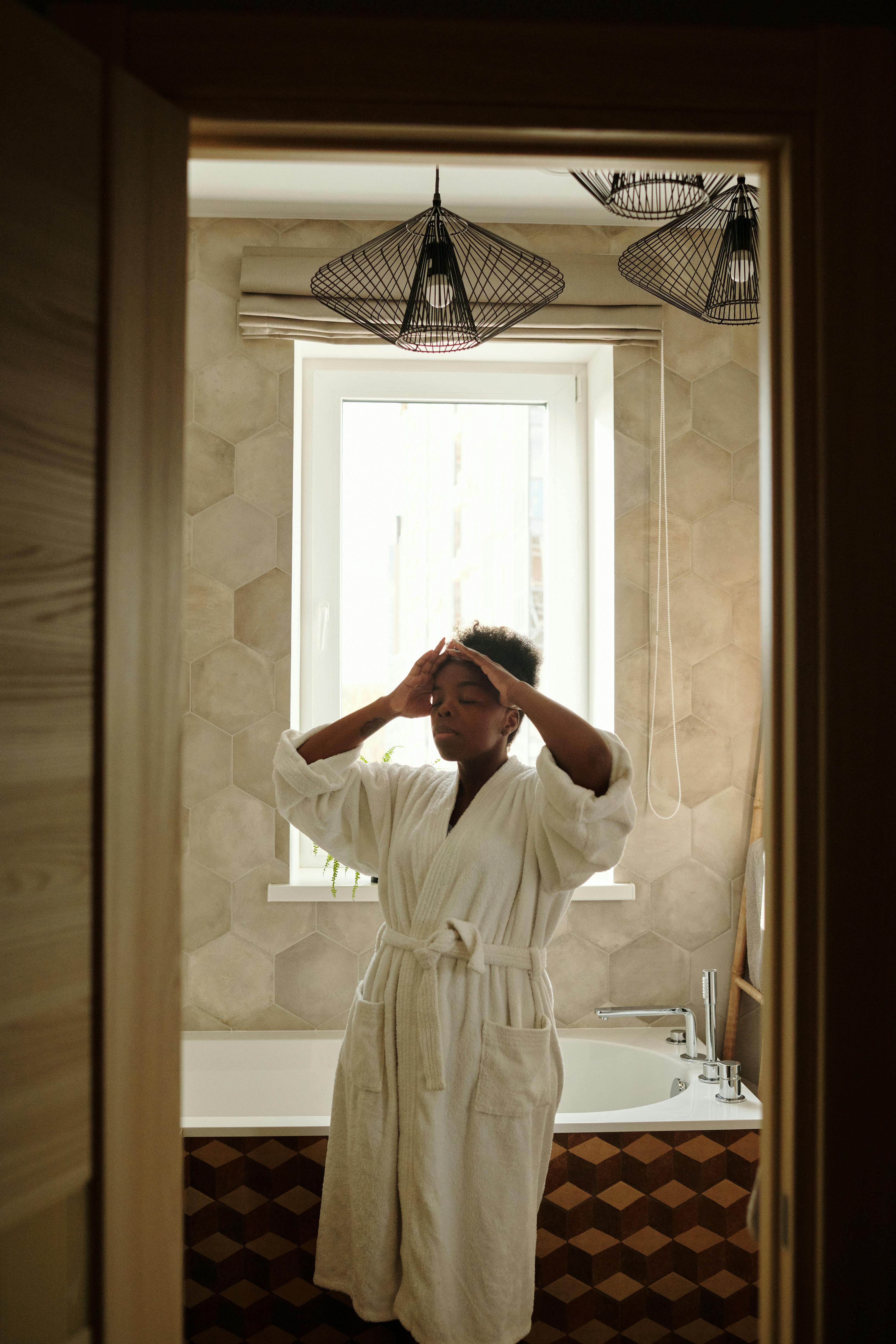 A Woman Inside a Bathroom · Free Stock Photo