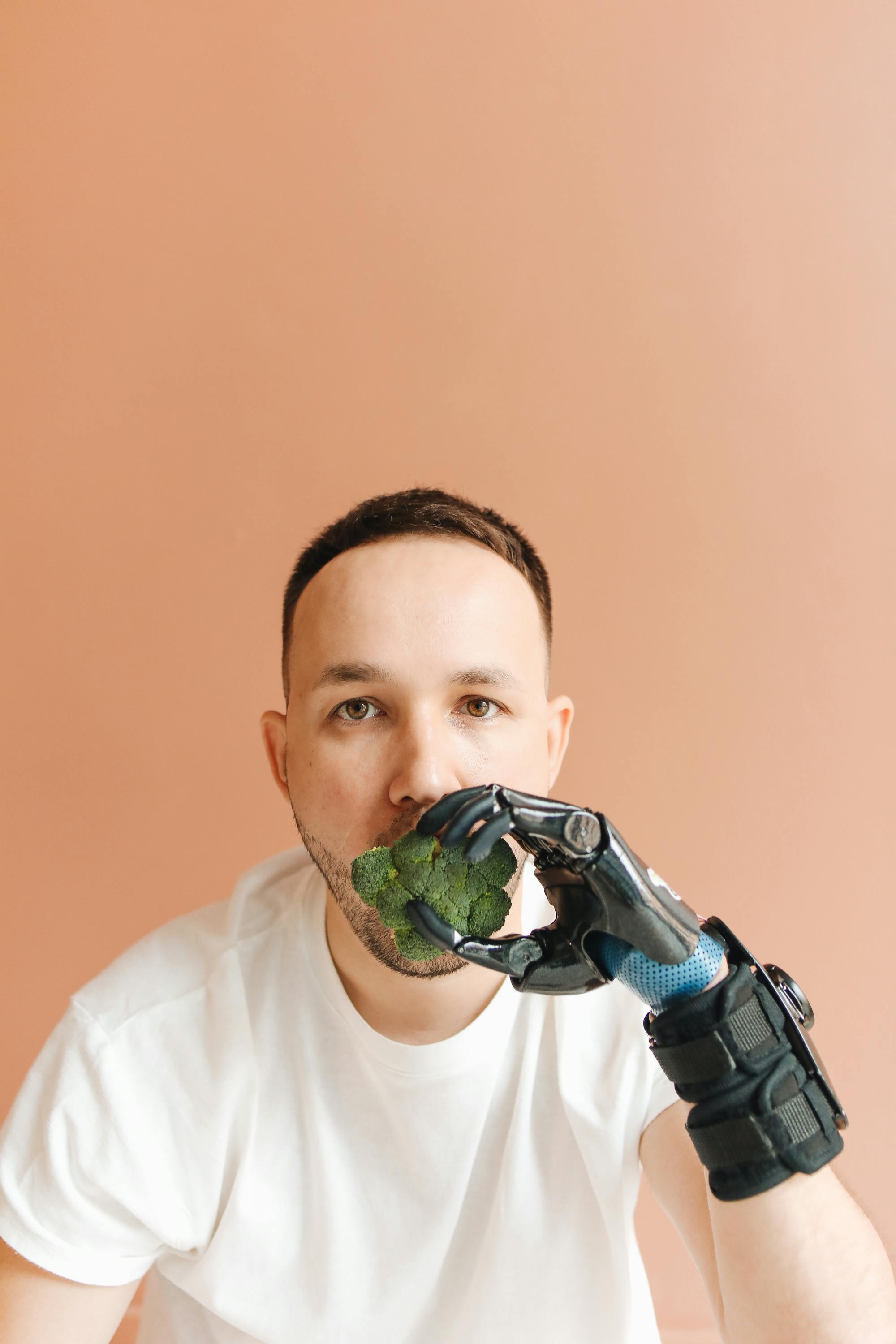 Man Eating Green Broccoli · Free Stock Photo
